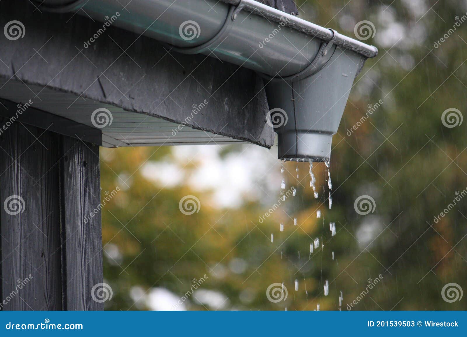 Closeup Shot of Water Drops Falling from Rain Gutters Stock Image ...