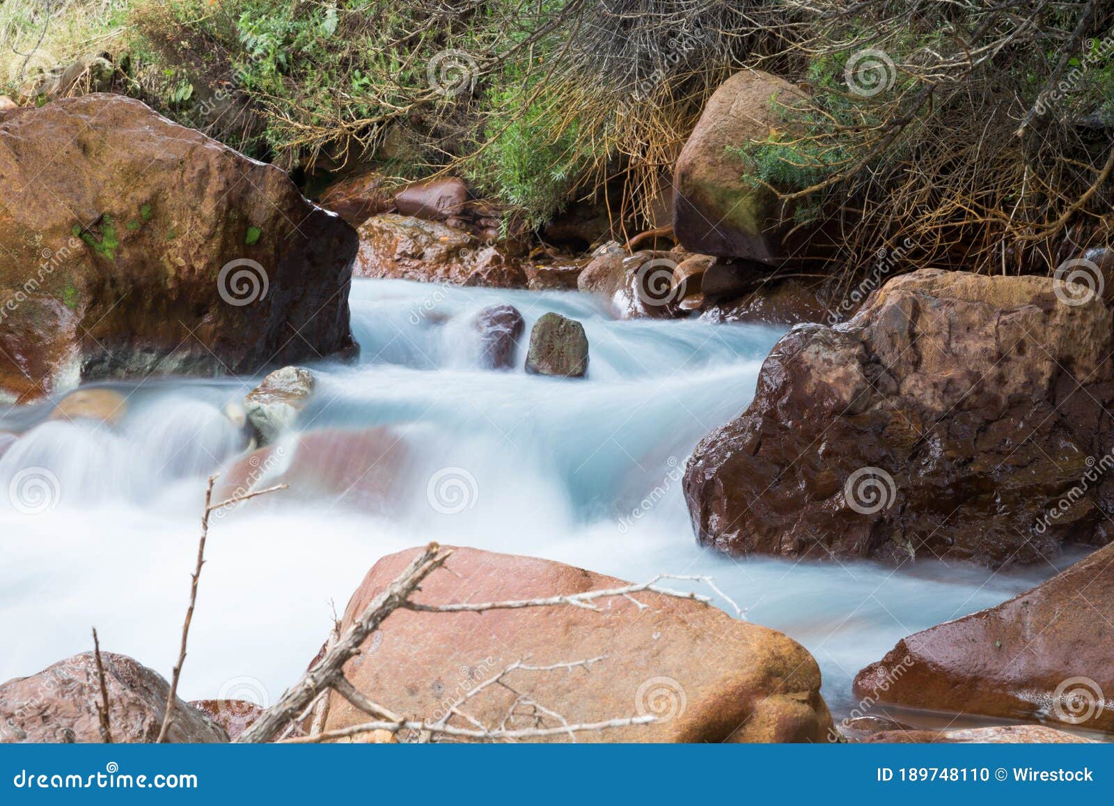 Closeup Shot of the Water Flowing through Stones Stock Photo - Image of ...
