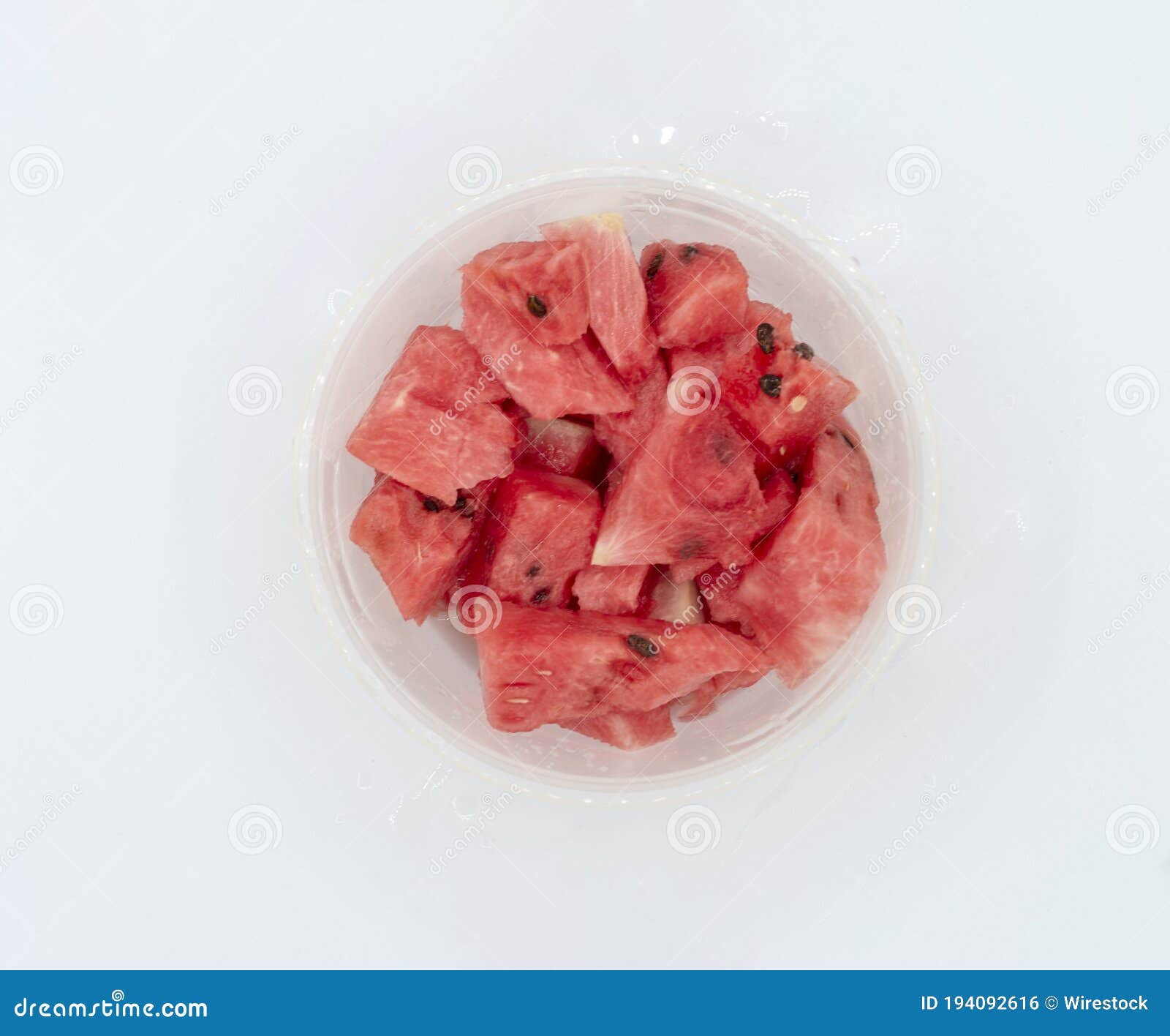 Closeup Shot of Watermelon Pieces in a White Lunch Box on White ...