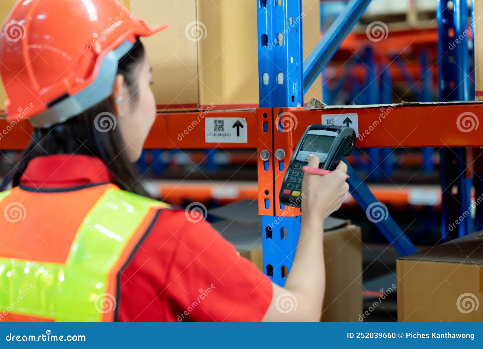 Closeup Shot of Worker Scanning Barcode Reader. Reading and Scanning ...