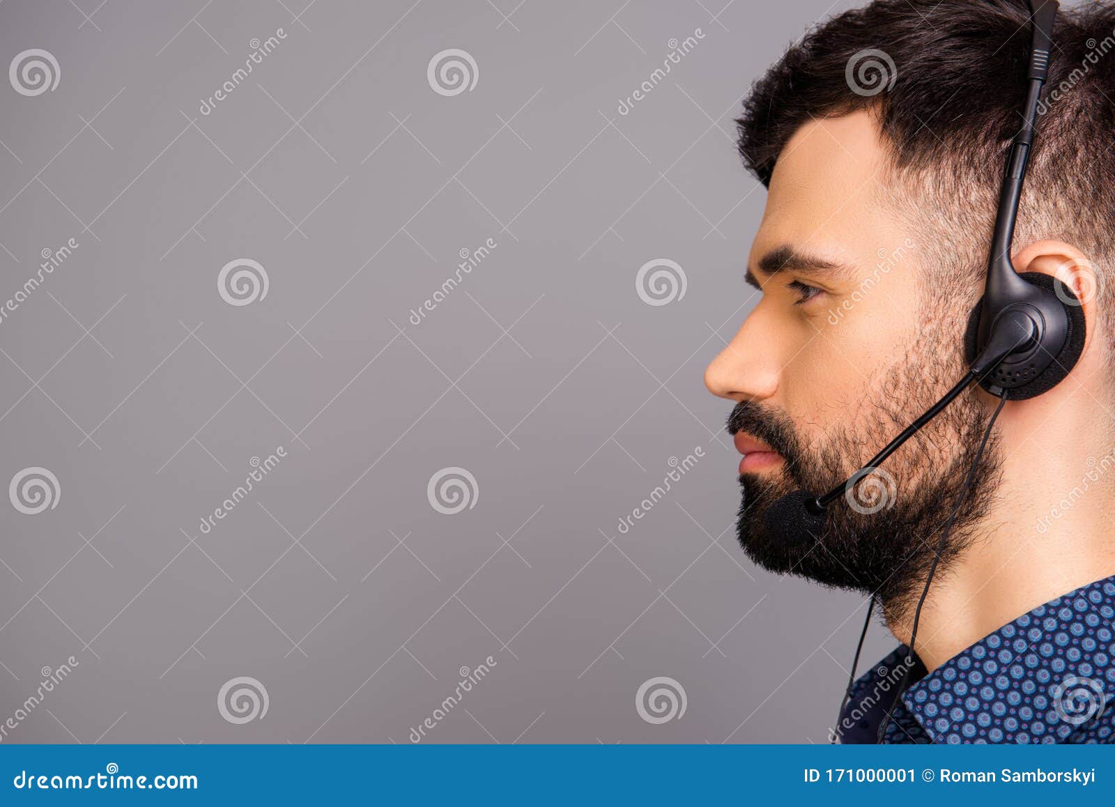 A Closeup Side-face Portrait of a Young Agent of Call Centre Stock ...