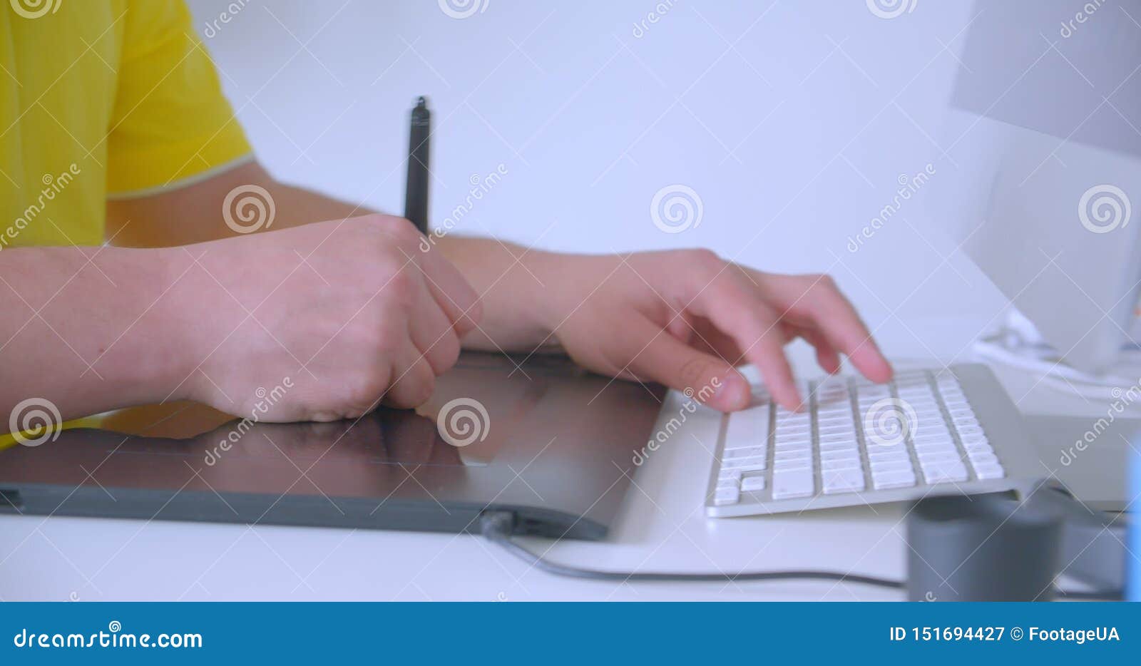 Closeup Side View Shoot of Designer Hands Typing on the Graphic ...