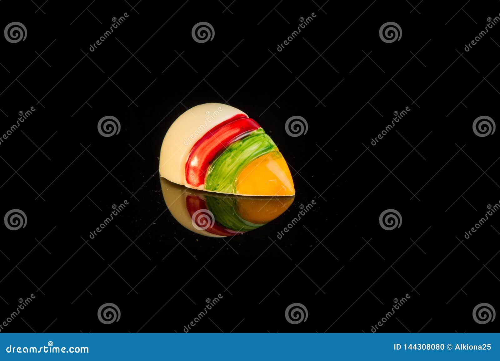 Closeup Single Shell-shaped Colorful Chocolate Candy with Reflection ...