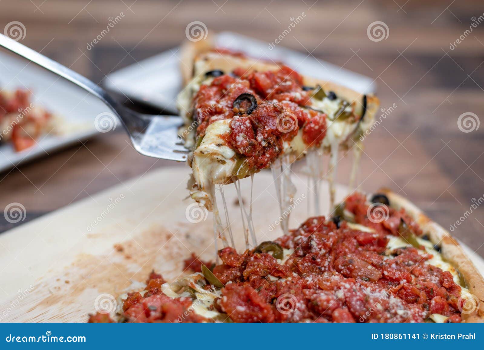 Closeup of a Slice of Deep Dish Pizza Being Served Stock Image - Image ...