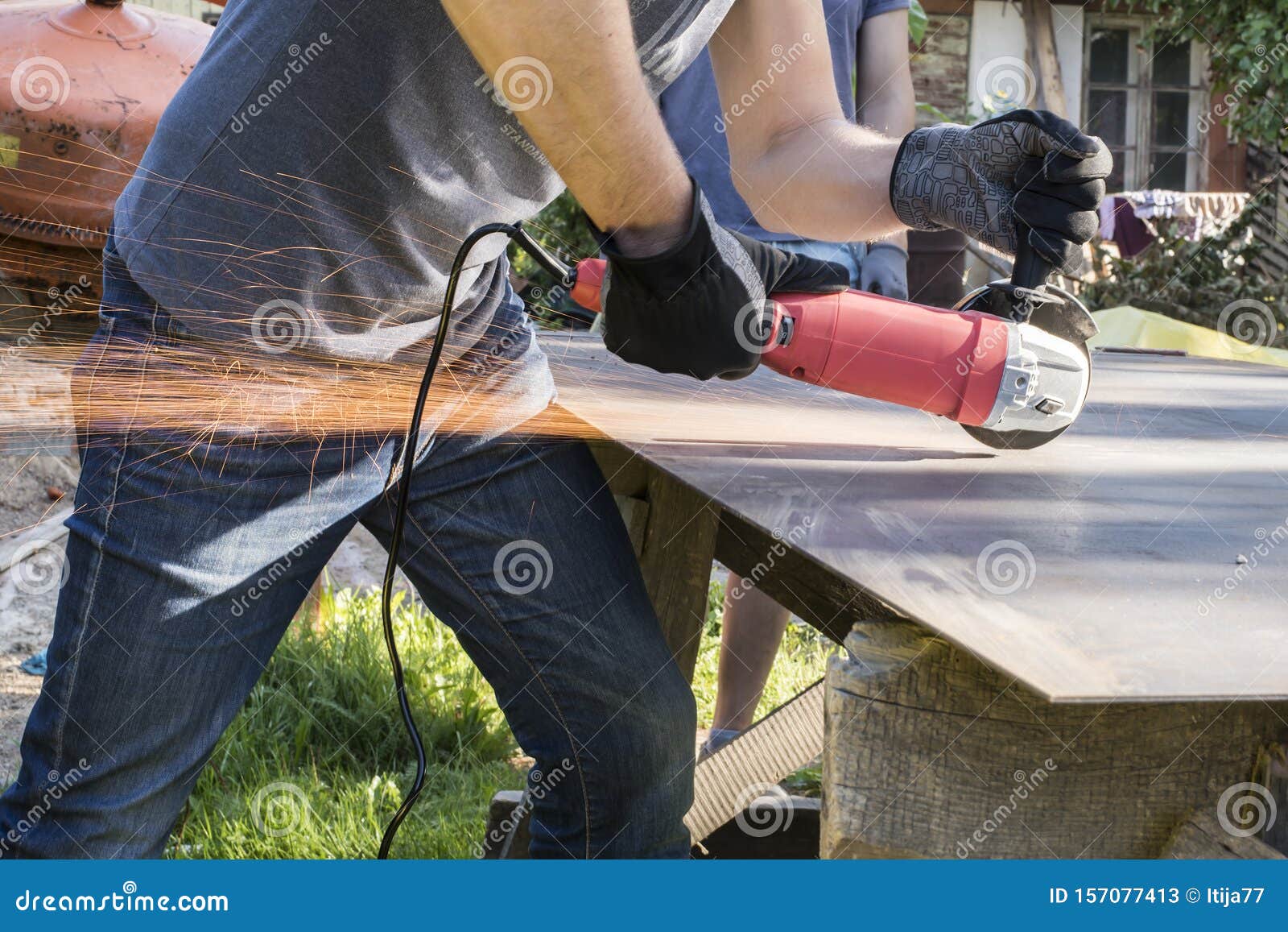 Sparkling Lights of Work with Angle Grinder Machine - Cutting Metal ...