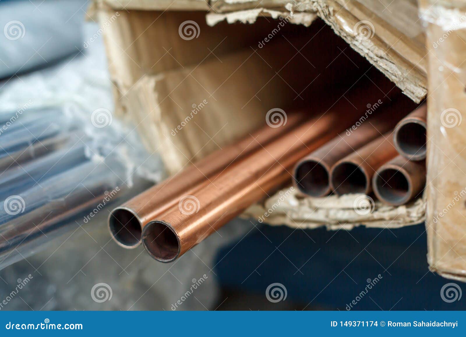 Closeup of a Stack of Copper Pipes for Water and Heating Systems, Soft ...