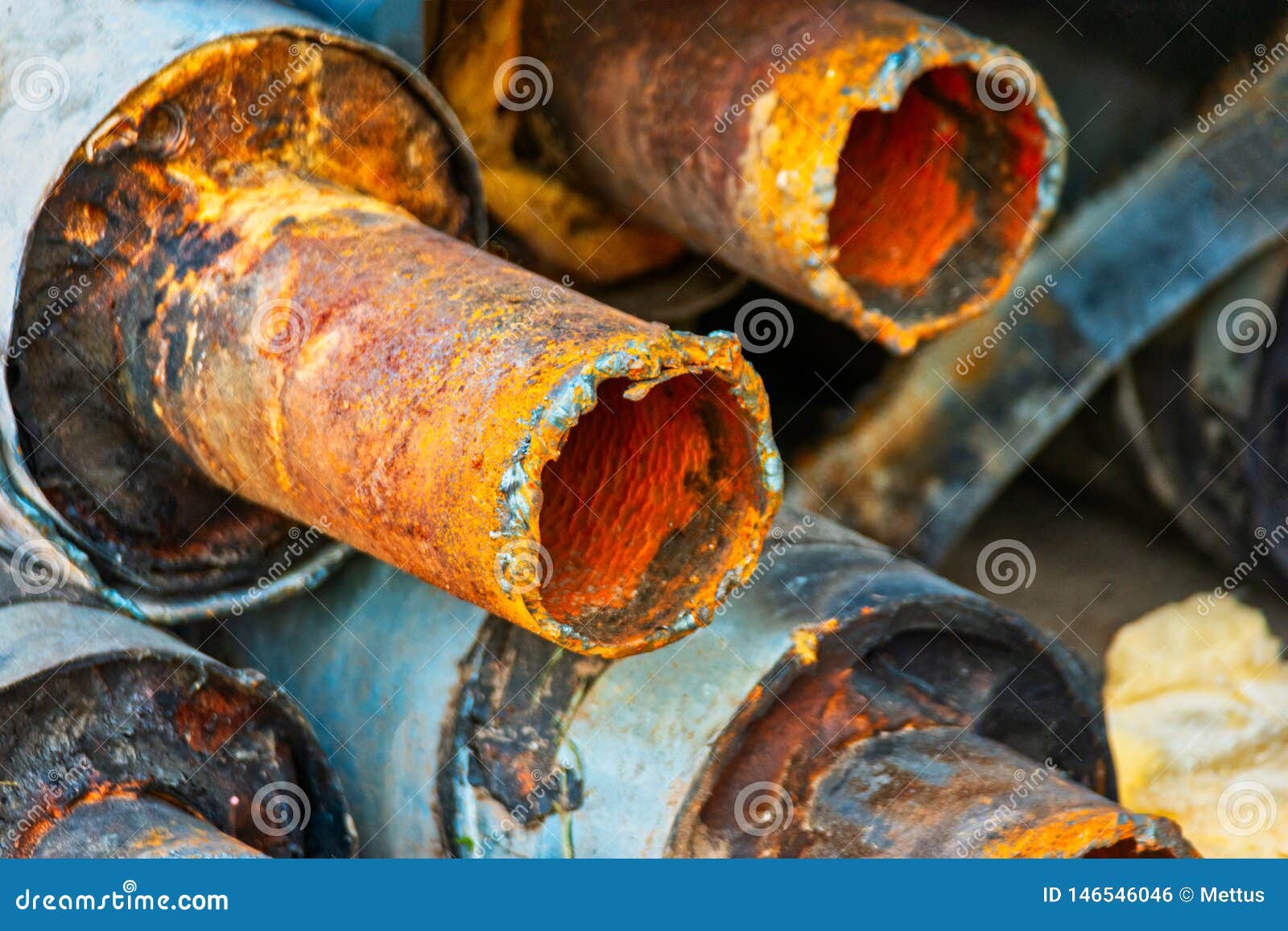 Closeup of Stack of Corroded Steel Pipes with Worn Insulation ...