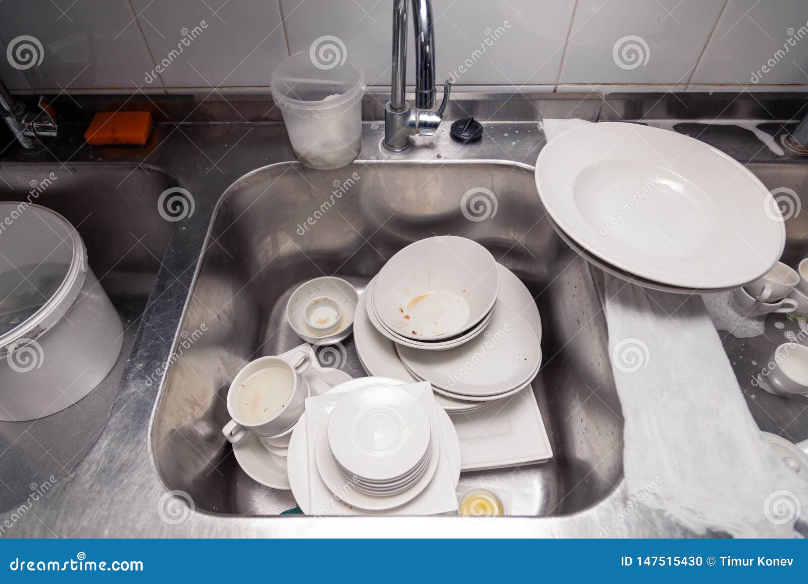 Closeup Stack of Dirty Dishes at Bottom of Metal Square Sink at ...