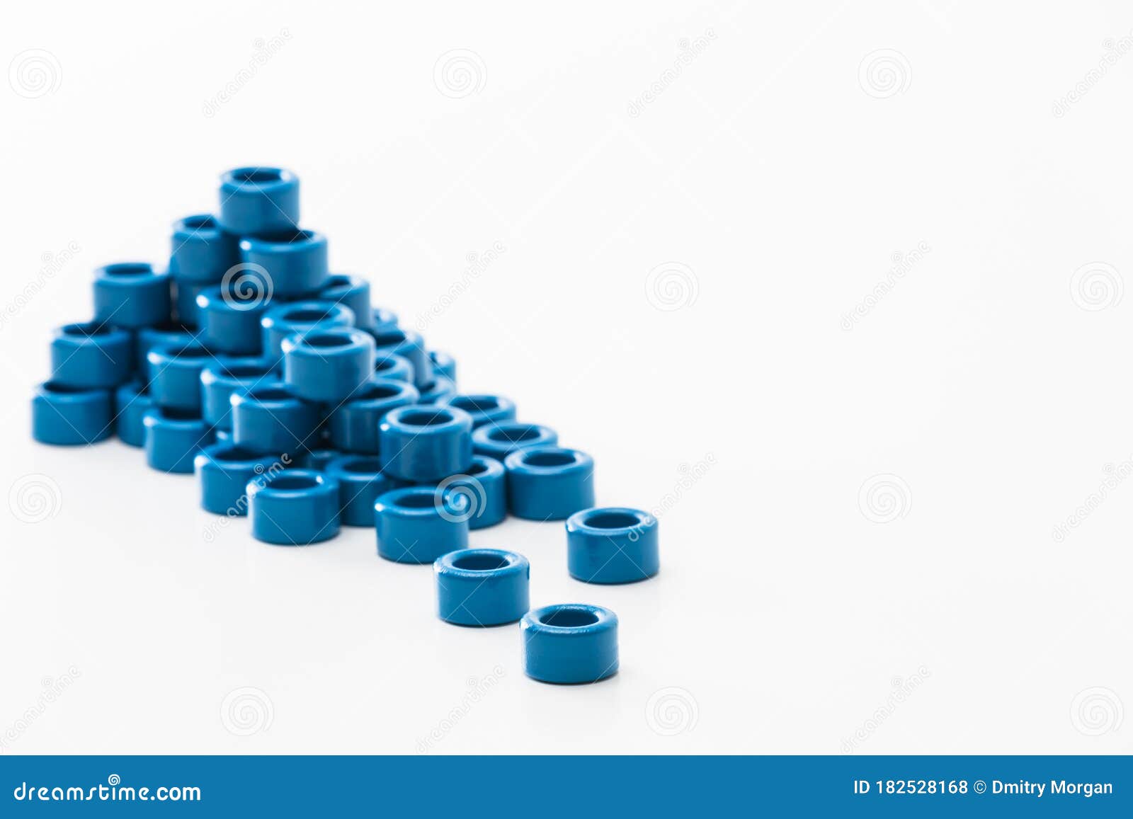 Closeup of Stack of Ferrite Magnetic Cores of Blue Color Placed in ...