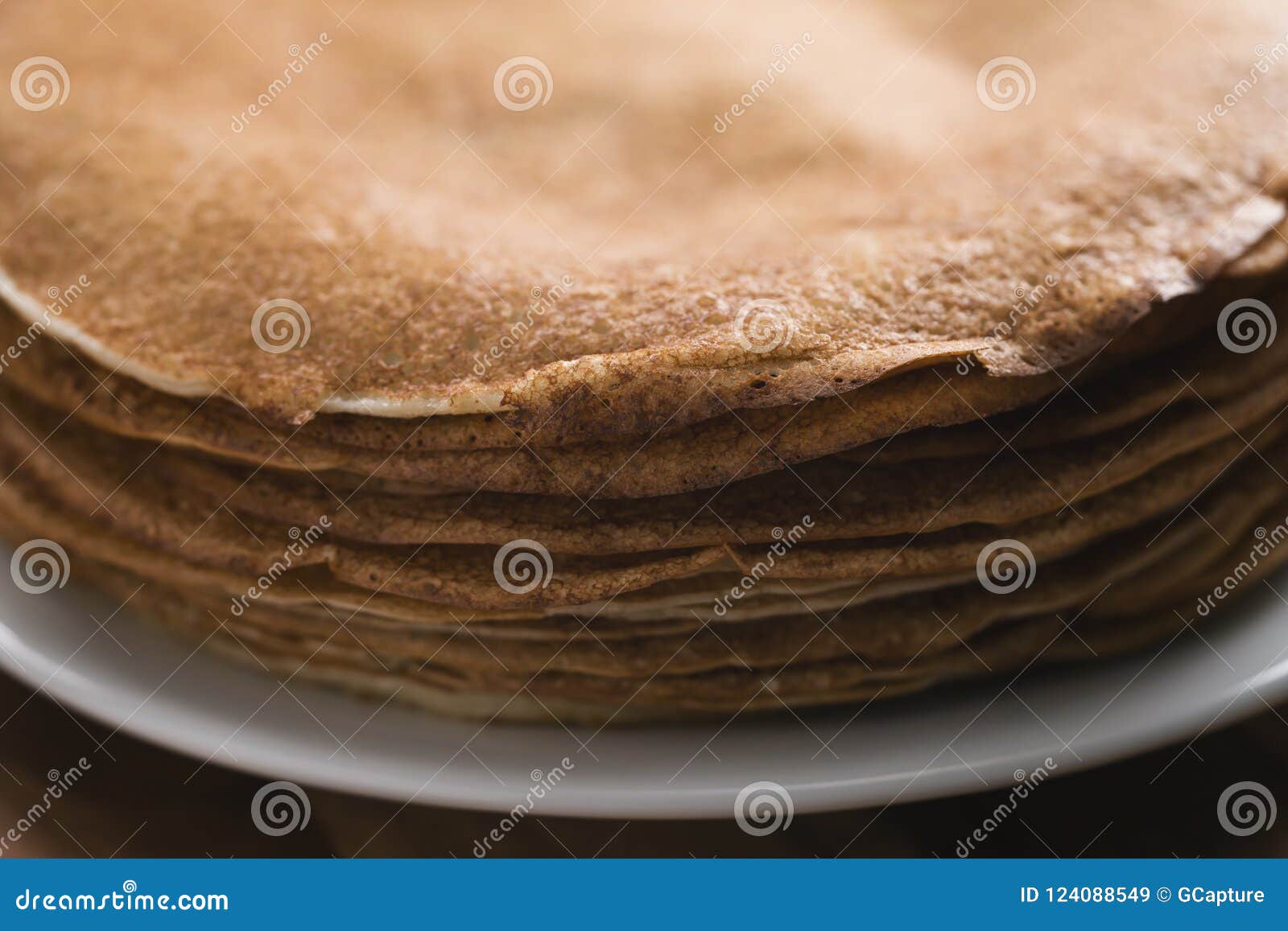 Closeup Stack of Fresh Hot Crepes or Blinis on Wood Table Stock Image ...