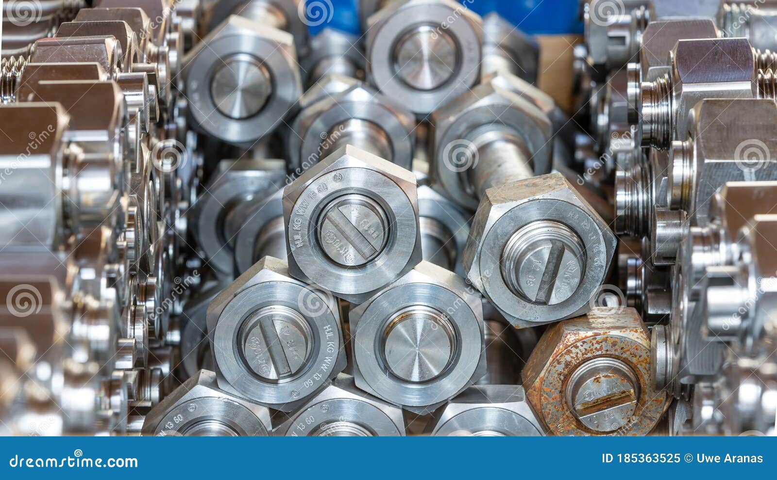 A pile of nuts and bolts stock image. Image of stack - 185363525