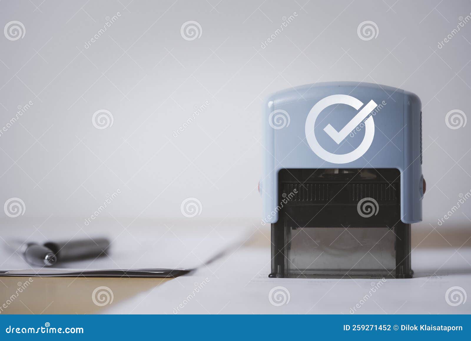 Closeup of Stamping for Approve Document on Table for Business Permit ...