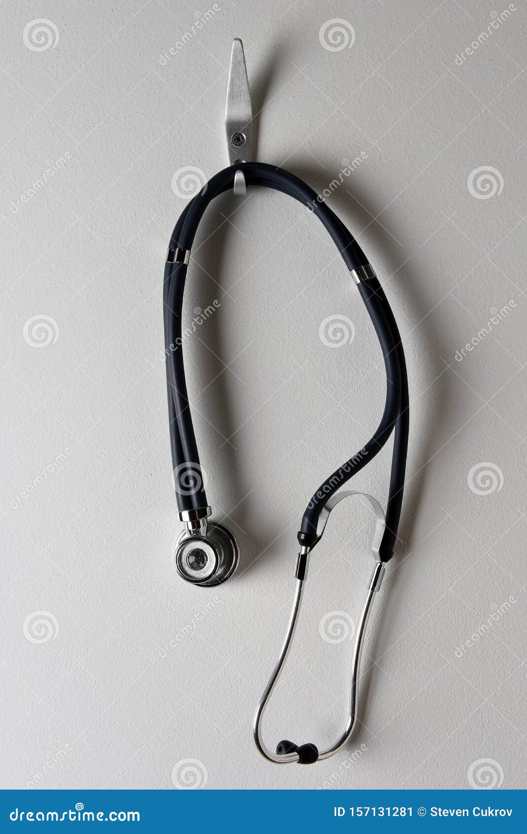 Closeup of a Stethoscope Hanging from a Hook on a Wall Stock Image ...