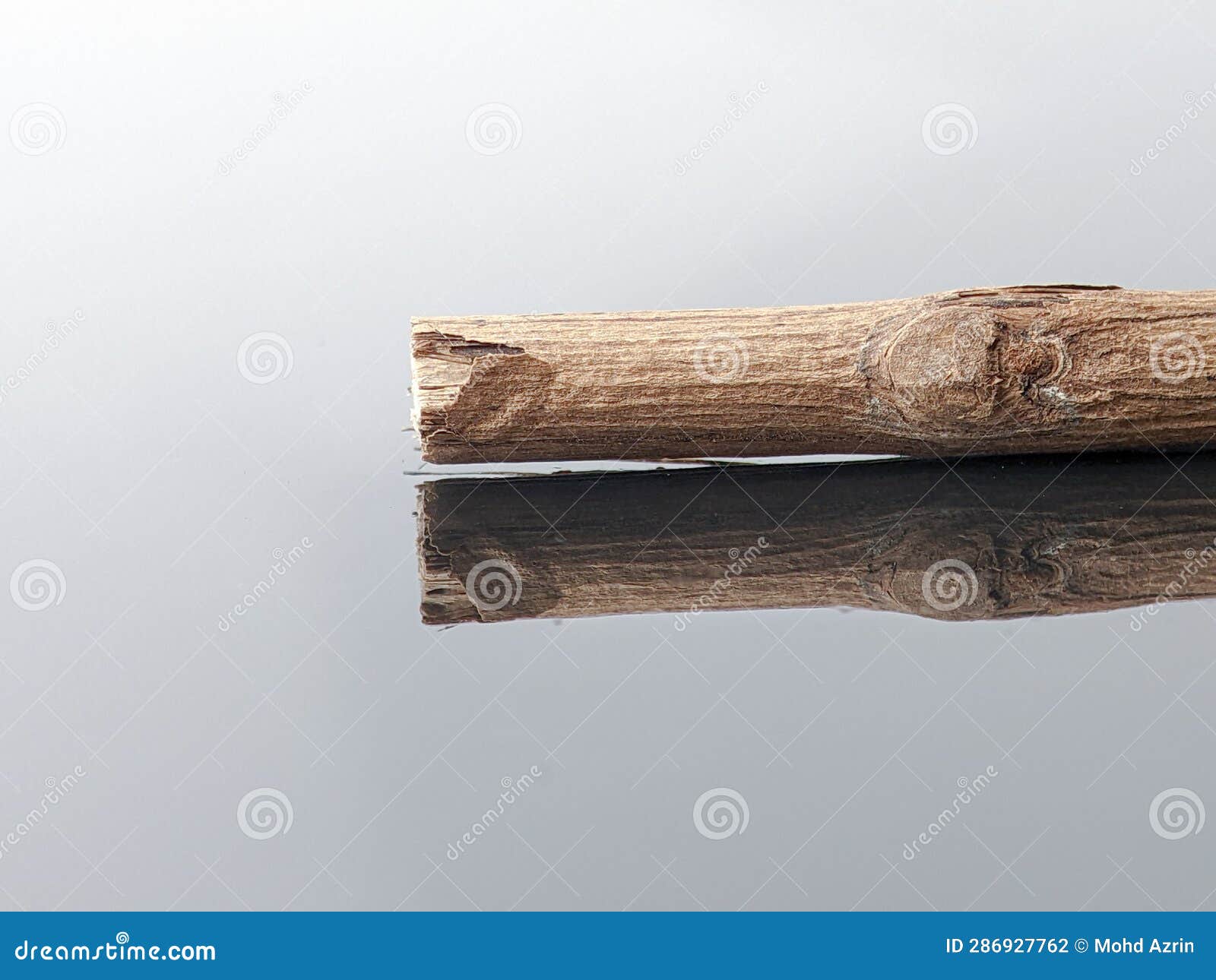 Closeup of a Stick of Wood with Reflection Stock Photo - Image of table ...