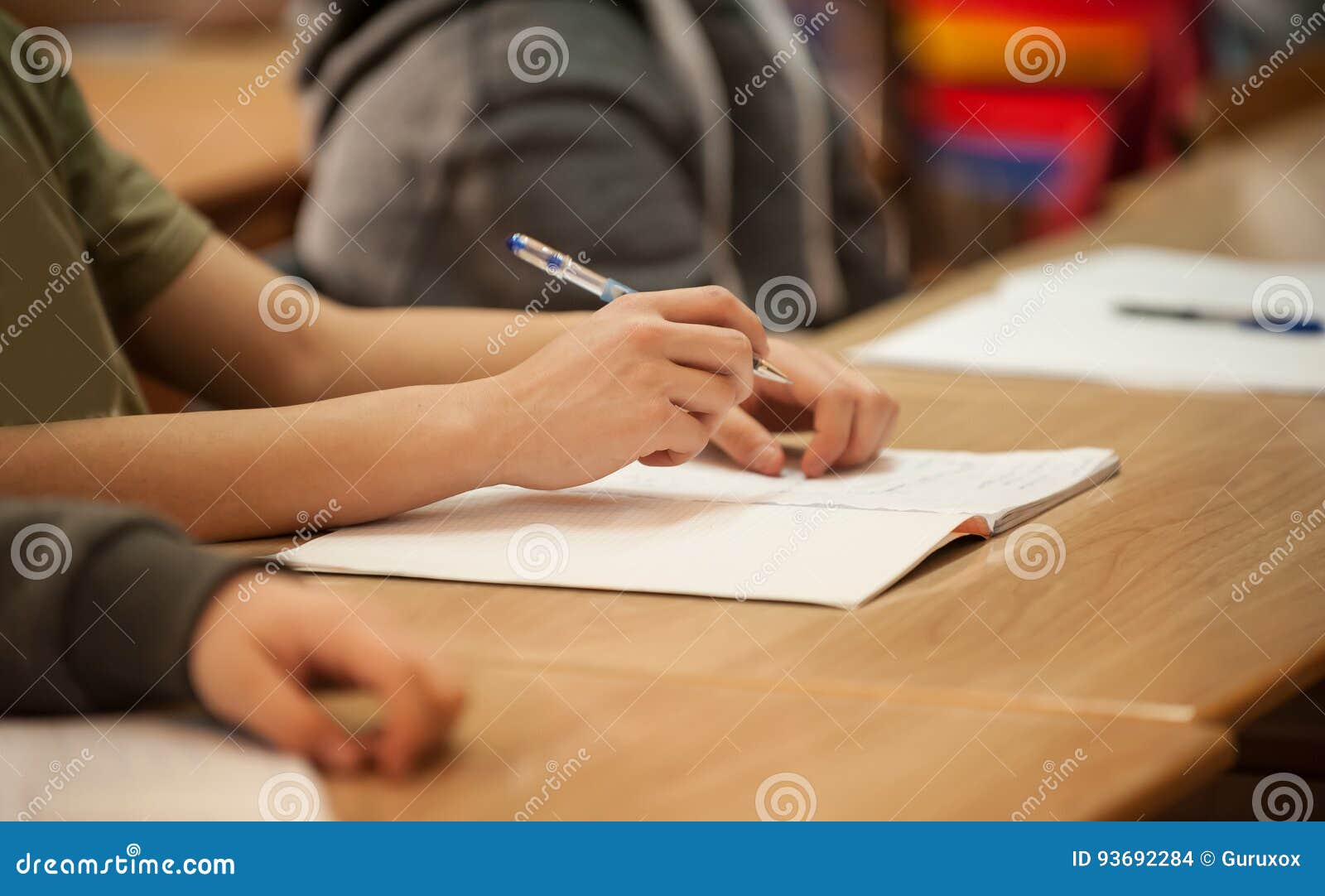 Closeup of Student Hands on School Table Writing To Notebook Stock ...