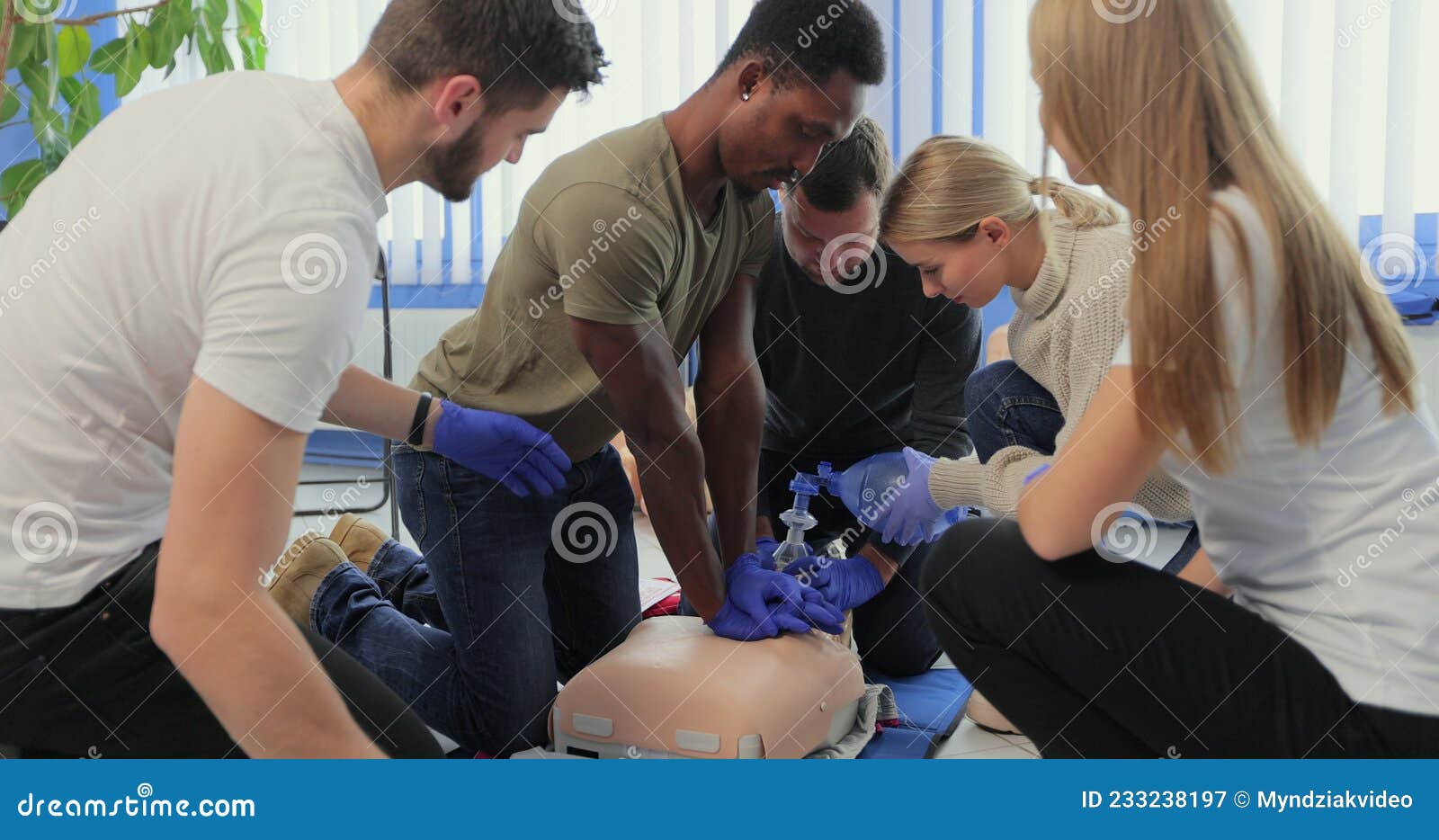 Closeup of Students Practicing CPR Chest Compression on Dummy. Stock ...