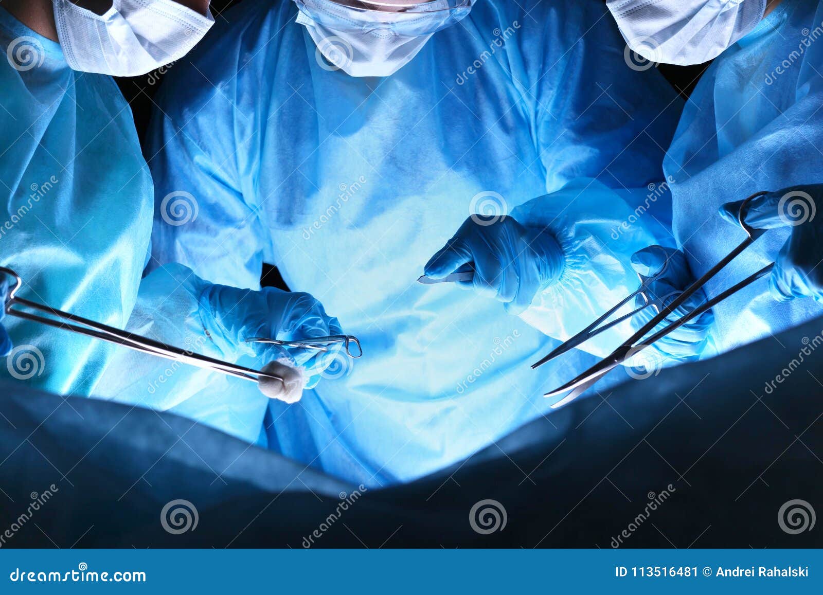 Closeup of Surgeons Performing Operation. Focus on Human Hands Using ...