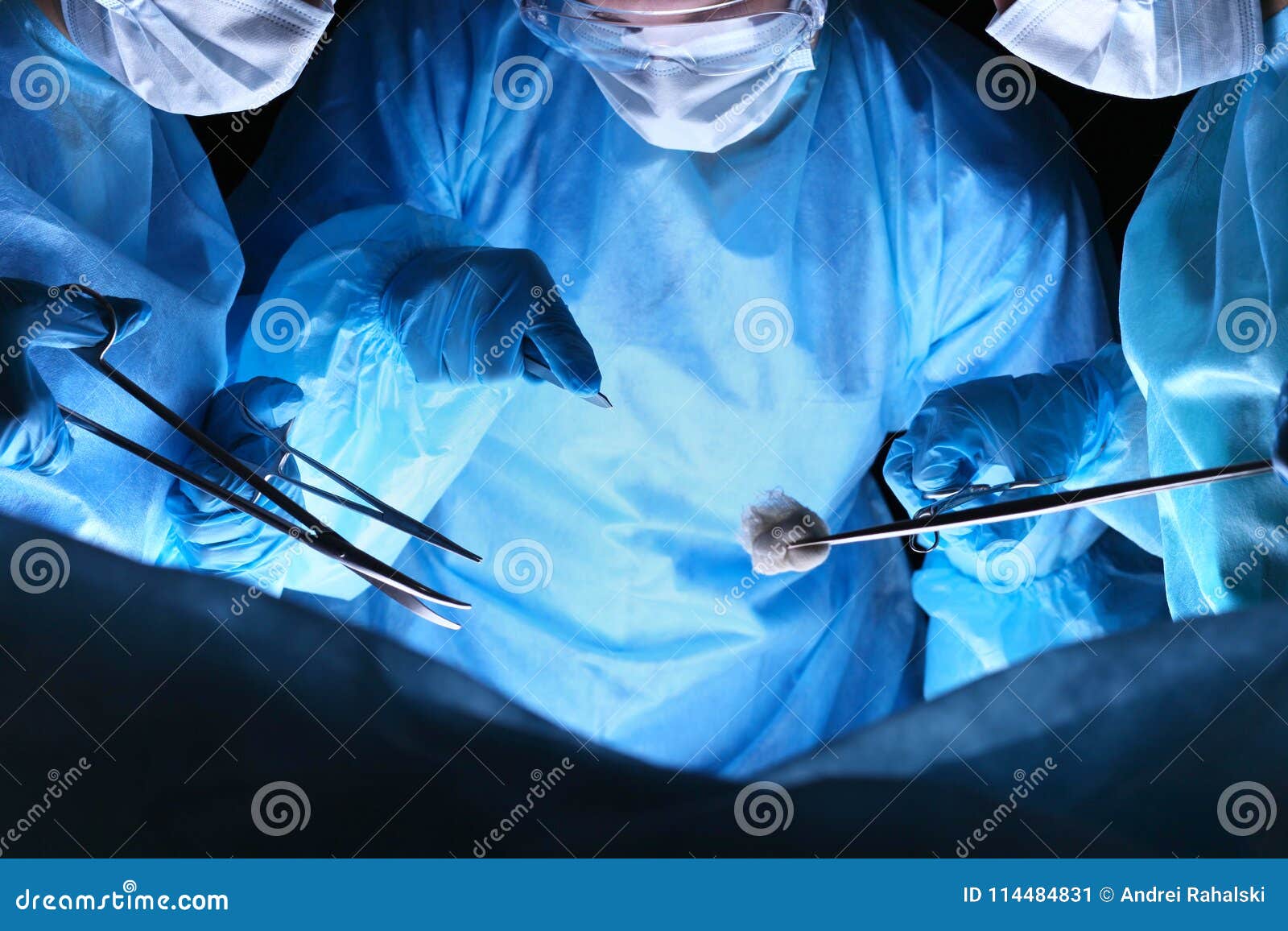 Closeup of Surgeons Performing Operation. Focus on Human Hands Using ...