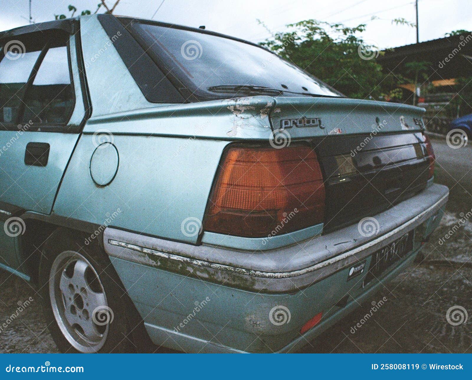 Closeup of the Taillight of an Old Beat-up Blue Car Editorial Stock ...