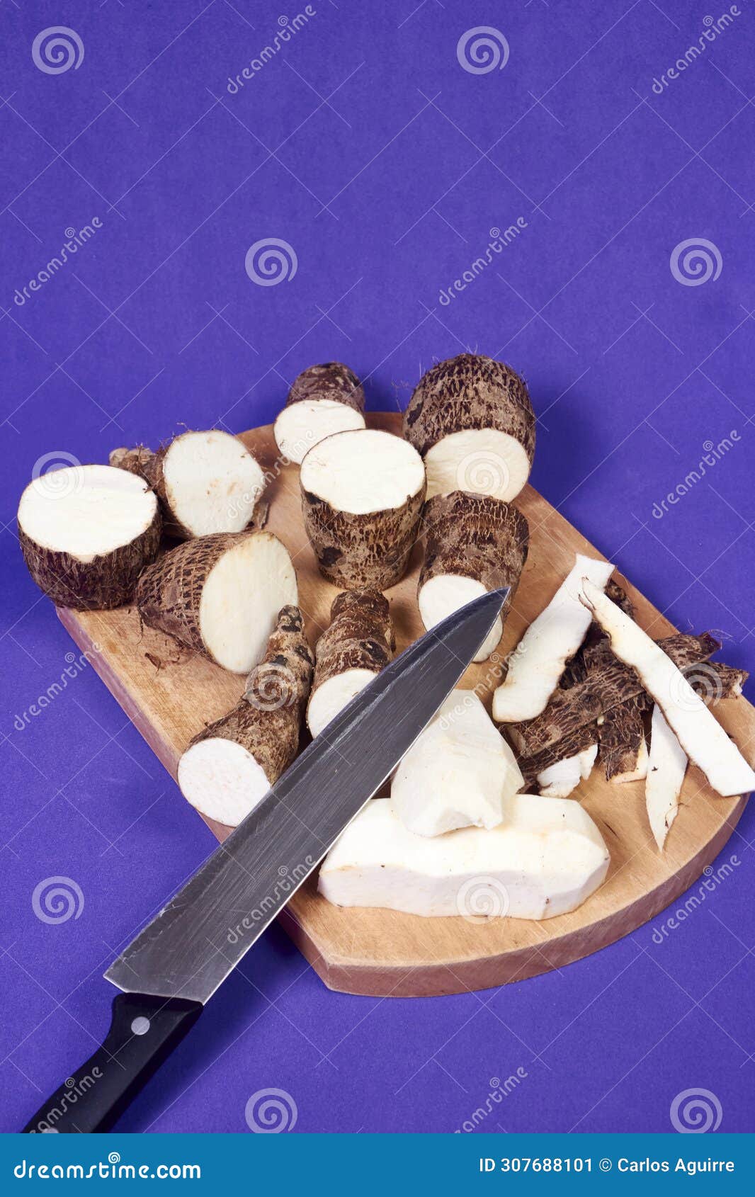 Closeup of Taro Root Vegetable, Eddo Malanga, Purple Background Stock ...