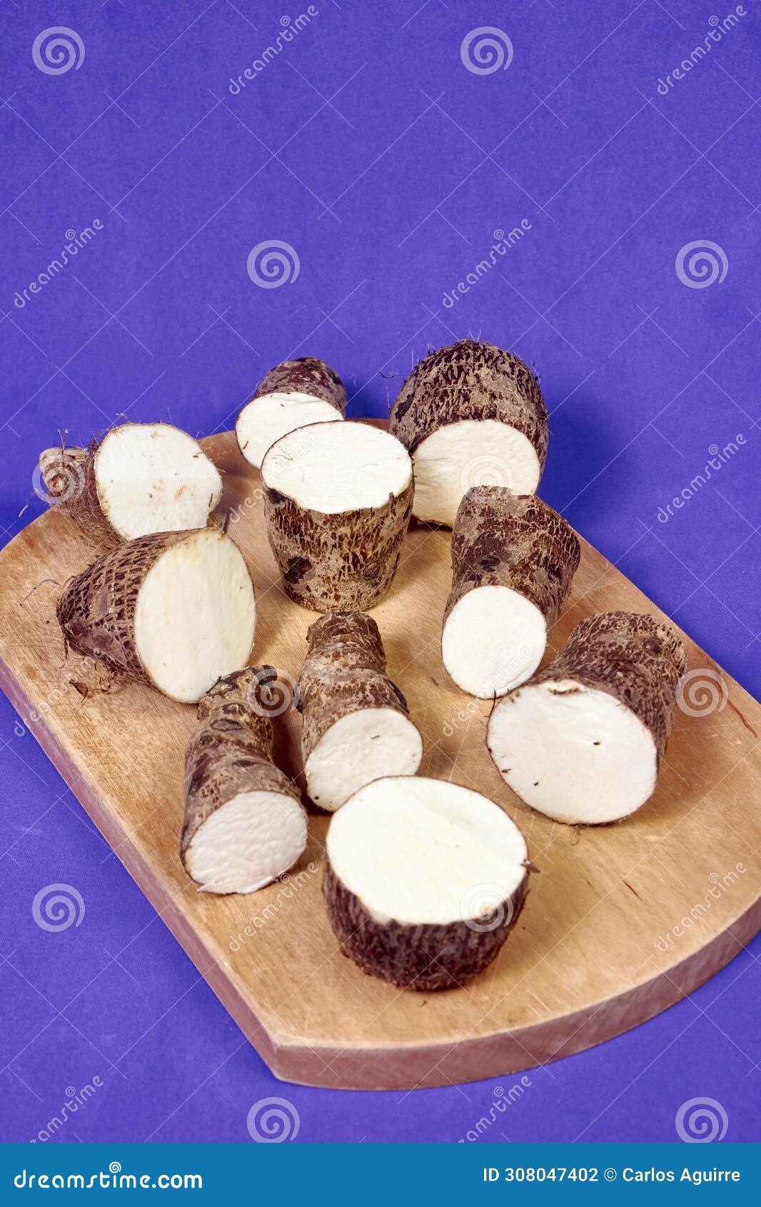 Closeup of Taro Root Vegetable, Eddo Malanga, Purple Background Stock ...