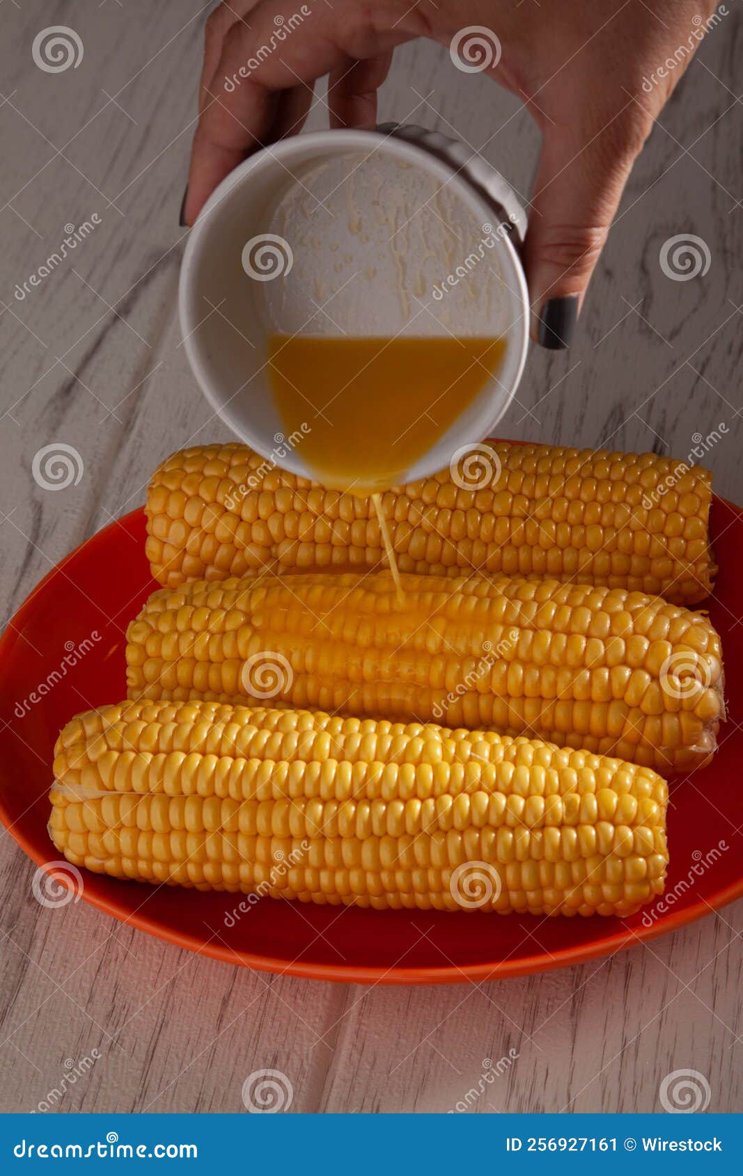 Closeup of Tasty Corn with Melted Butter Pouring on it Stock Image ...