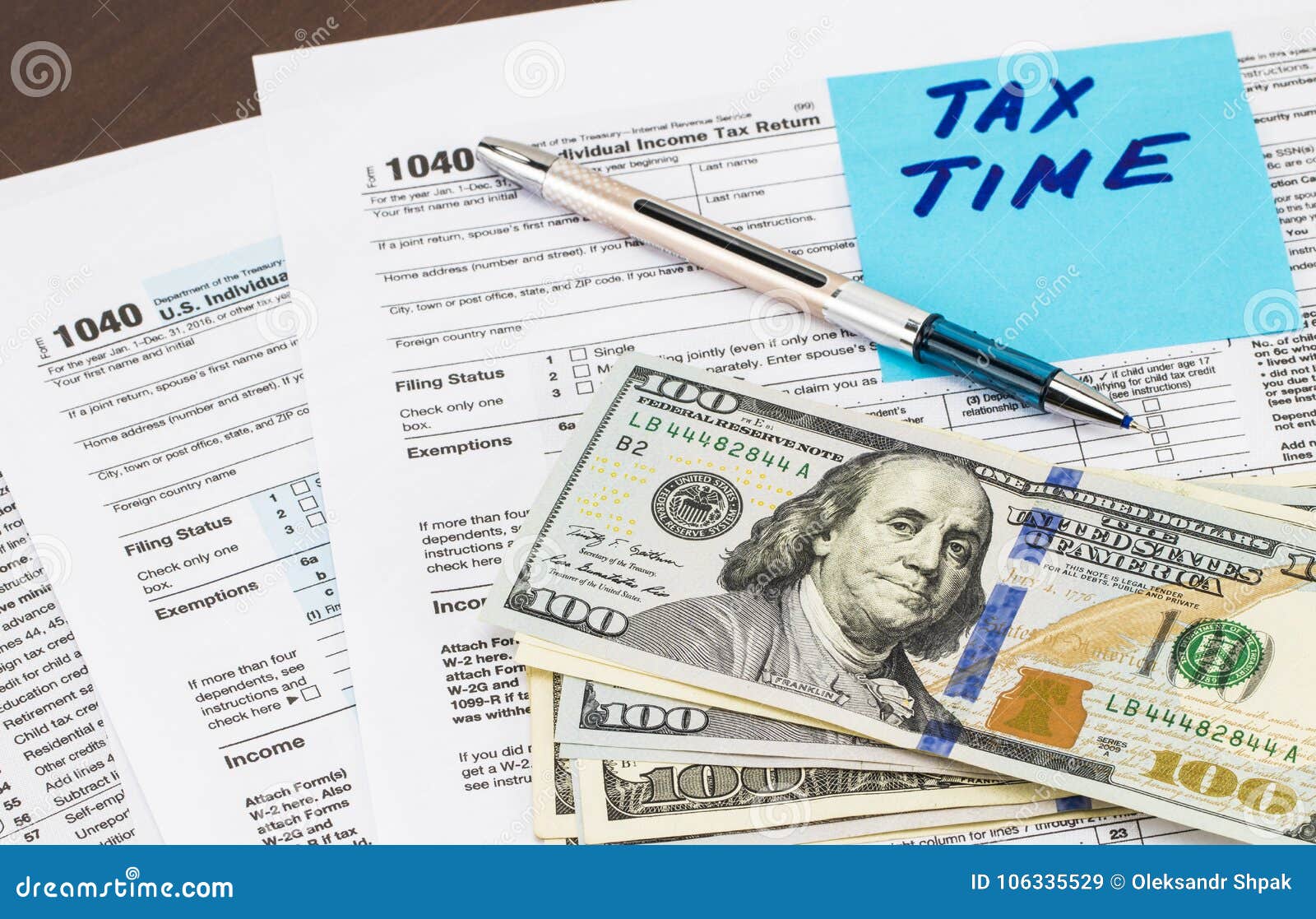 Closeup of Tax Time - Written on a Sticky Notes with Money Editorial ...