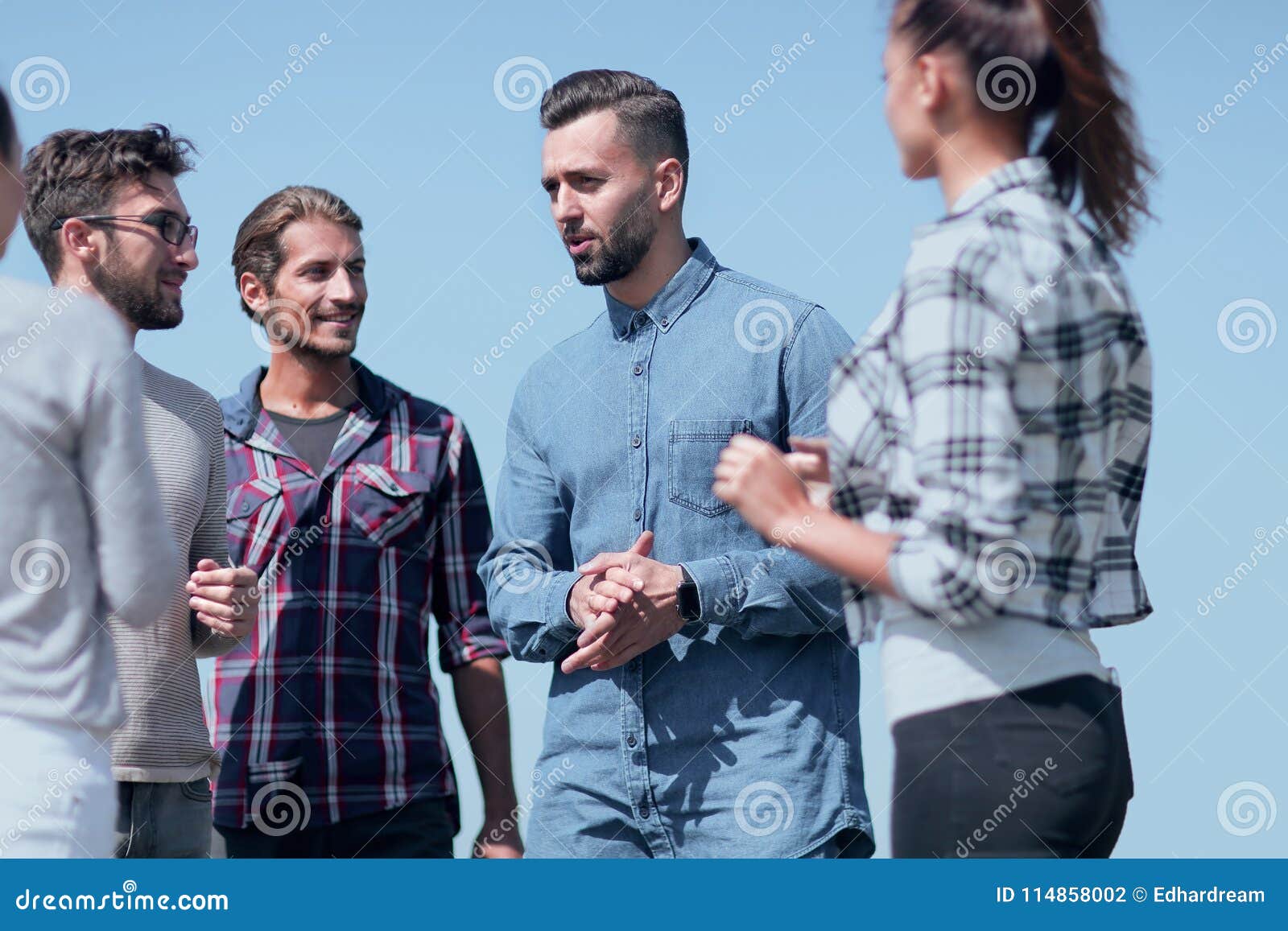 Closeup .a Team of Friends is Discussing Stock Photo - Image of ...