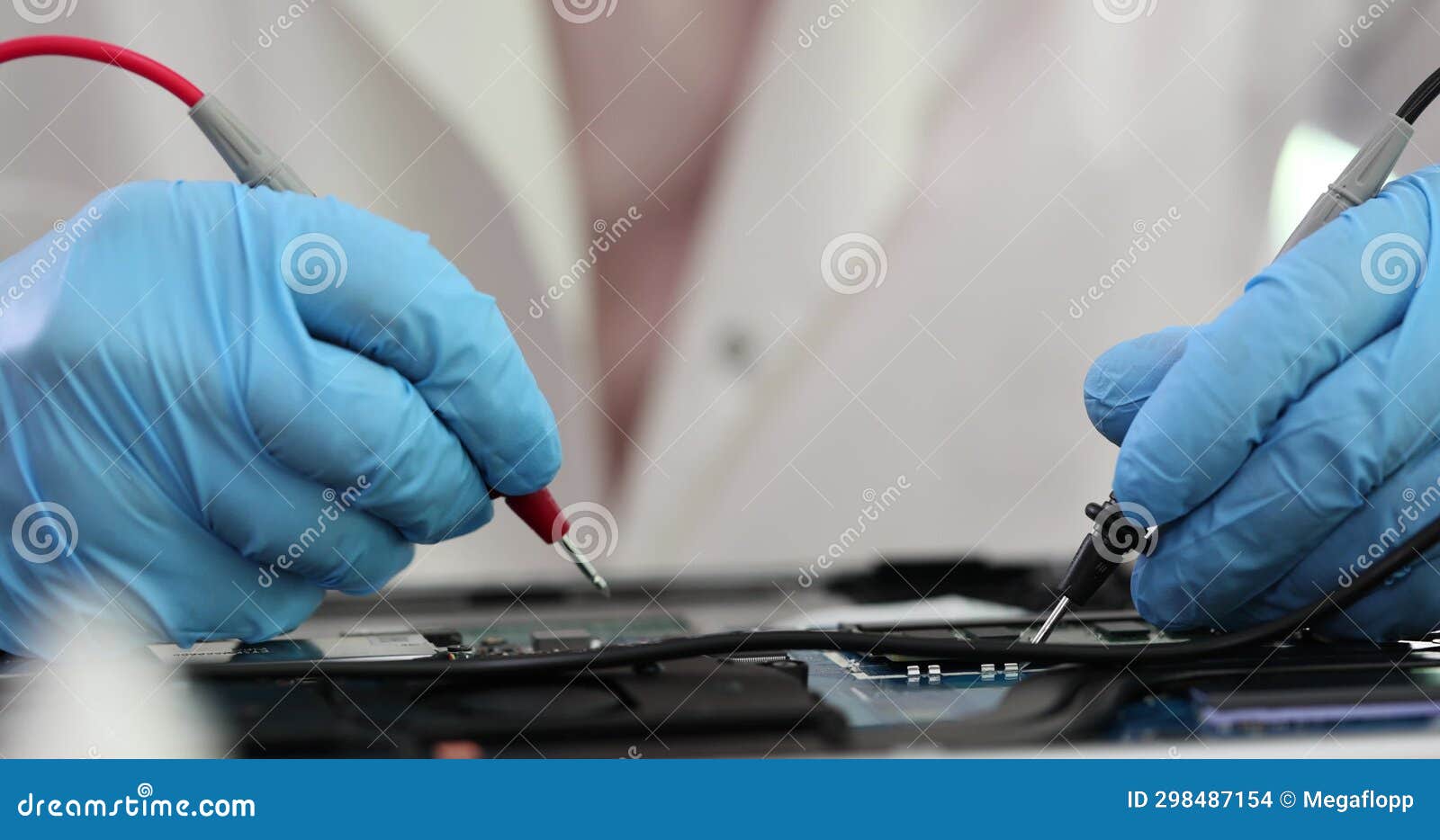 Closeup of Technician Hand Measuring Electrical Voltage of Computer ...