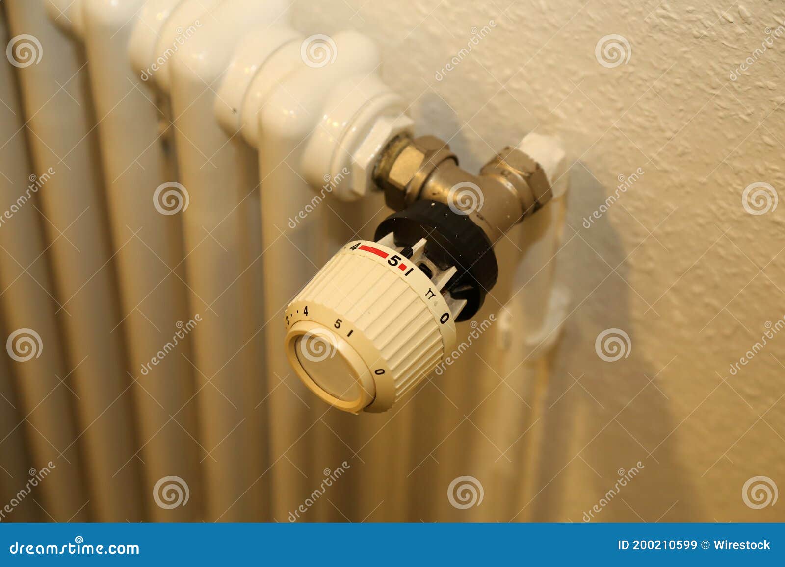 Closeup of a Temperature Controller on the White Heater with Radiator ...