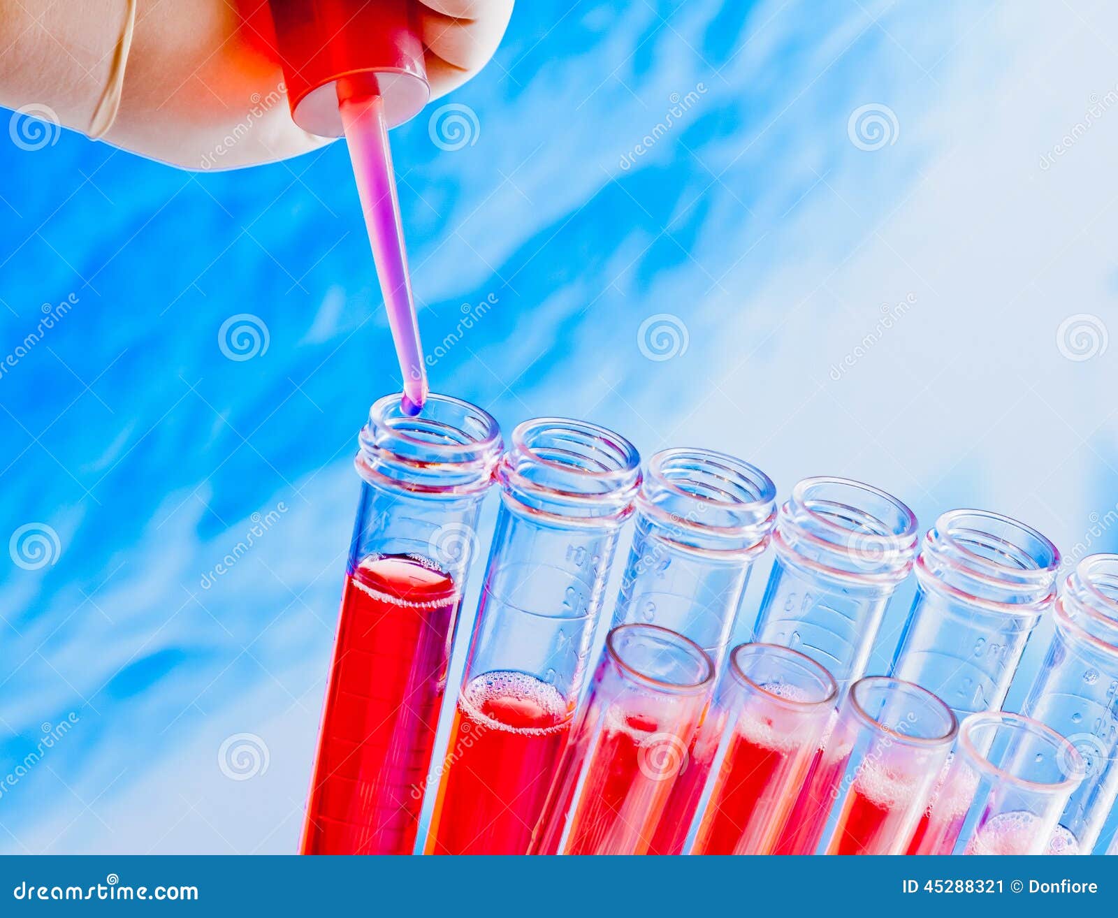 Closeup of Test Tubes with Pipette on Red Liquid Stock Image - Image of ...