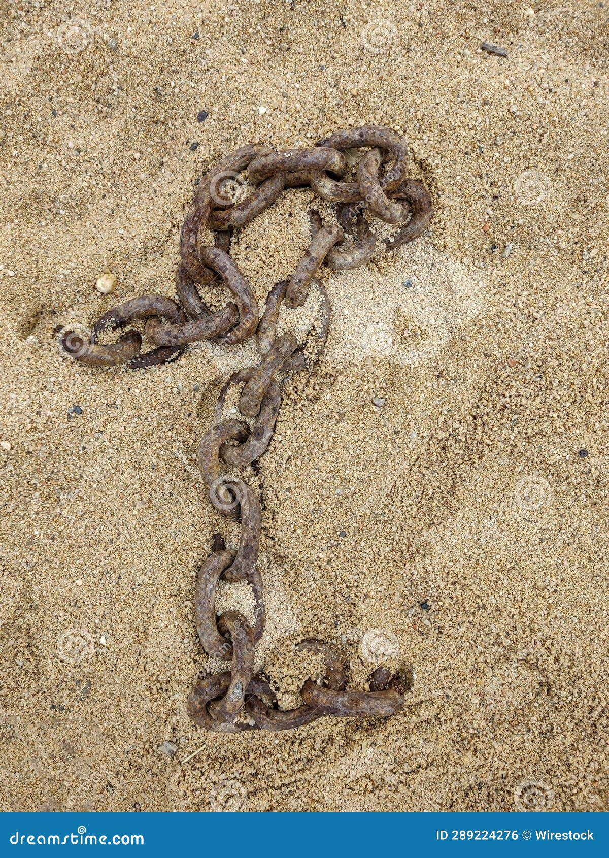 Closeup of the Texture of a Thick Metallic Chain in the Sand of the ...