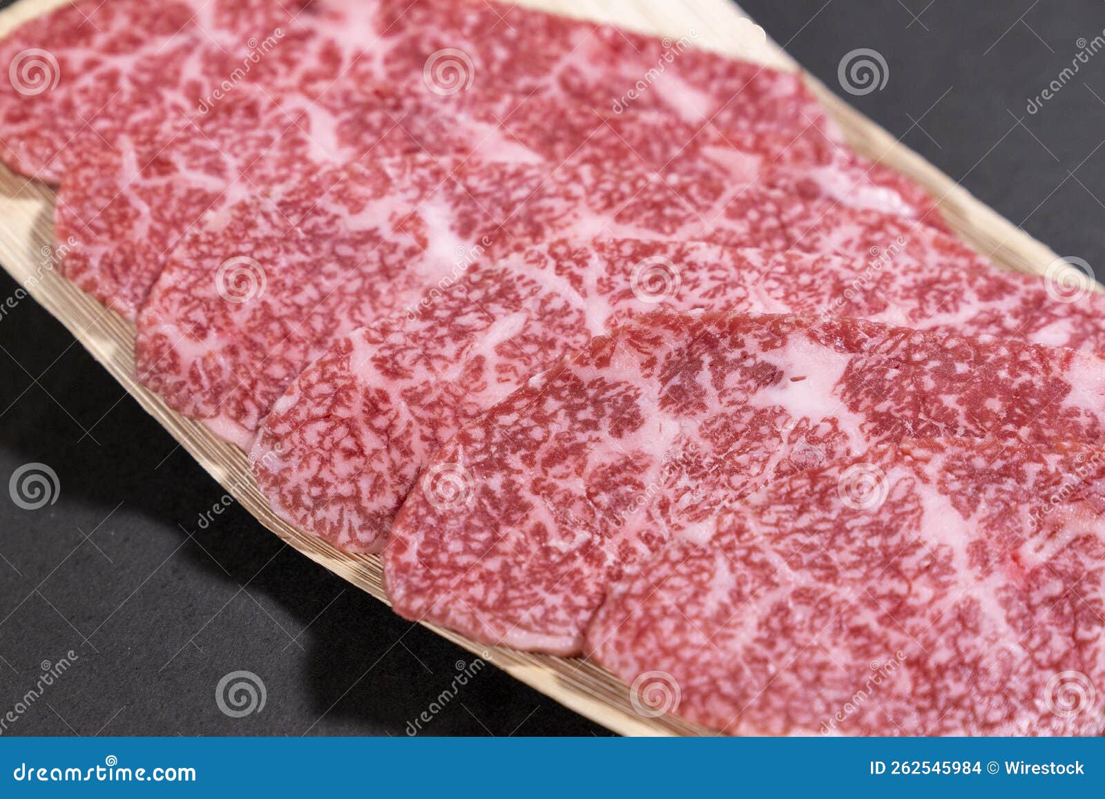 Closeup of Think Raw Wagyu Beef Slices on a Board on the Table Stock ...