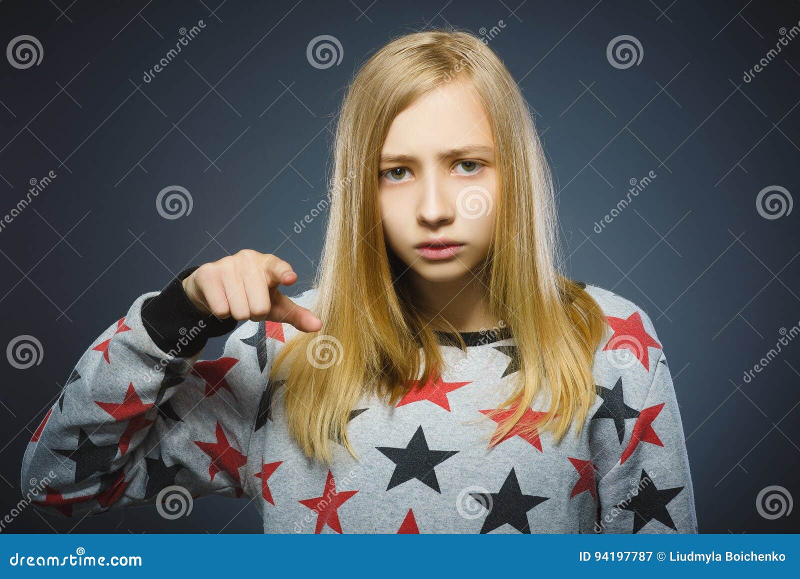 Closeup Thoughtful or Contemptuous Girl Show at Camera on Gray Stock ...