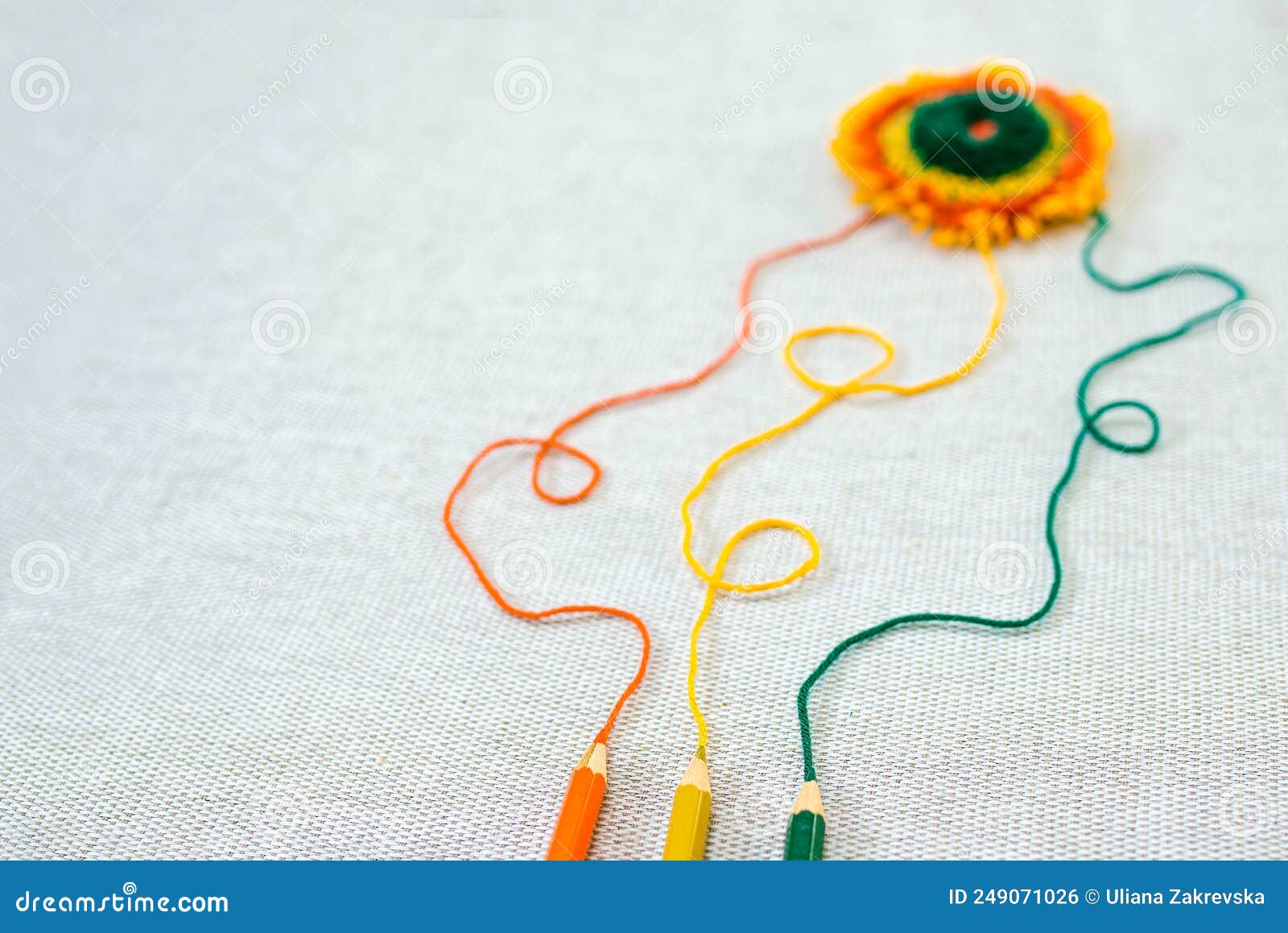 Closeup of Three Colored Pencils Thith Threads of Same Color that Go To ...