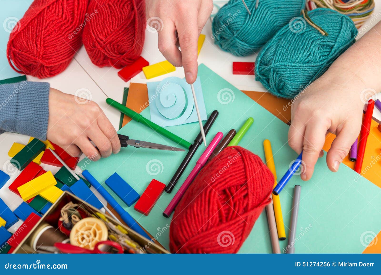 Closeup with Three Hands and a Lot of Handicraft Materials Stock Photo ...