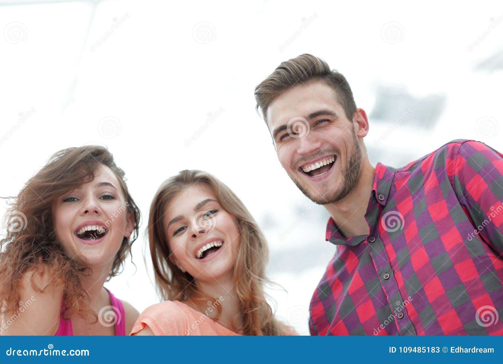 Closeup of Three Young People Smiling on White Background Stock Image ...
