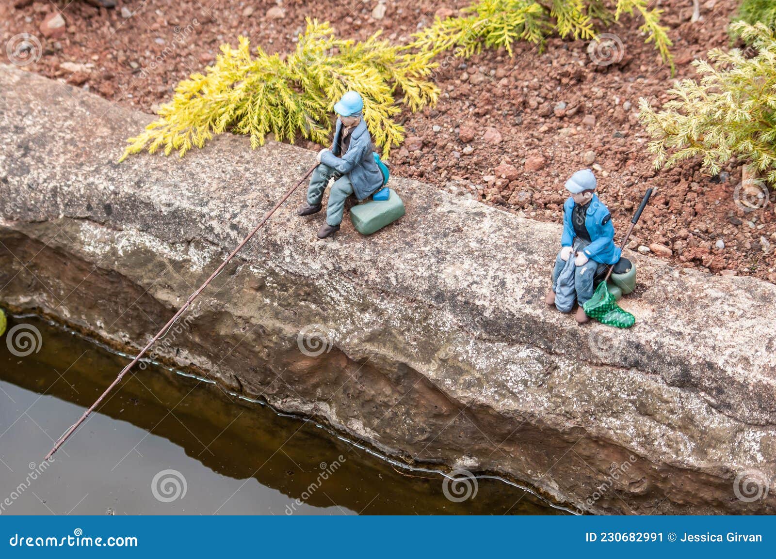 Closeup of Tiny Model Men Fishing Stock Image - Image of tiny, model ...