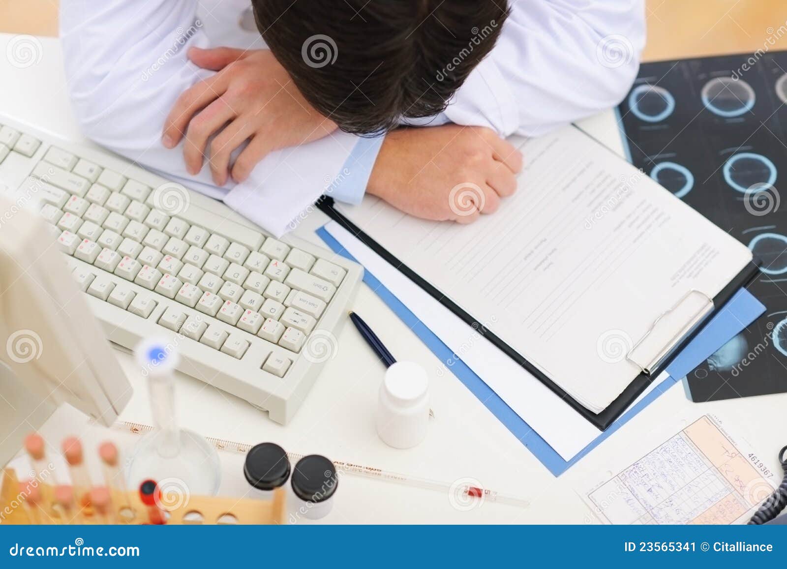 Closeup on Tired Medical Doctor Sleeping on Table Stock Image - Image ...