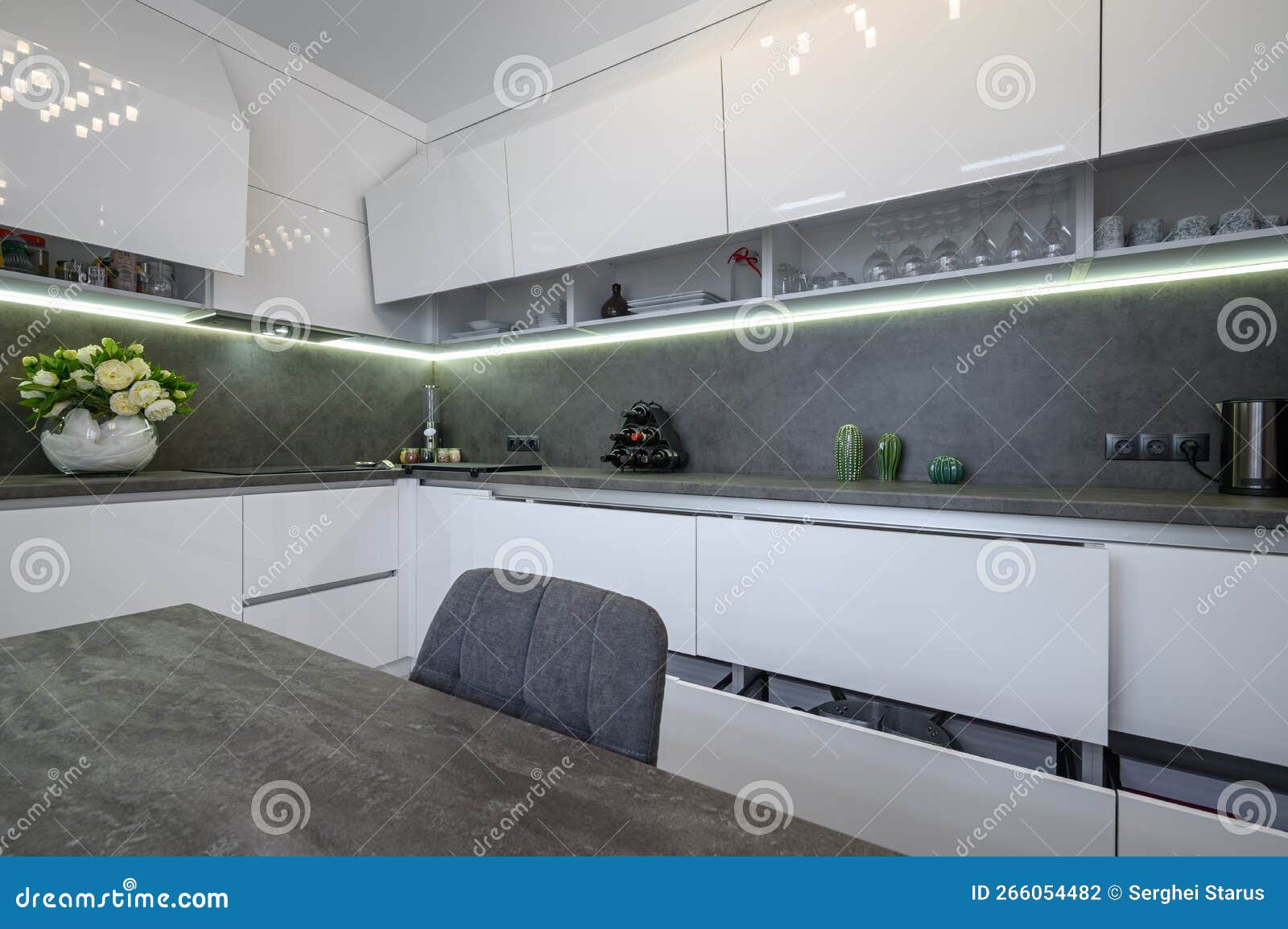 Closeup To Dark Grey Dining Table at White Trendy Kitchen Stock Photo ...