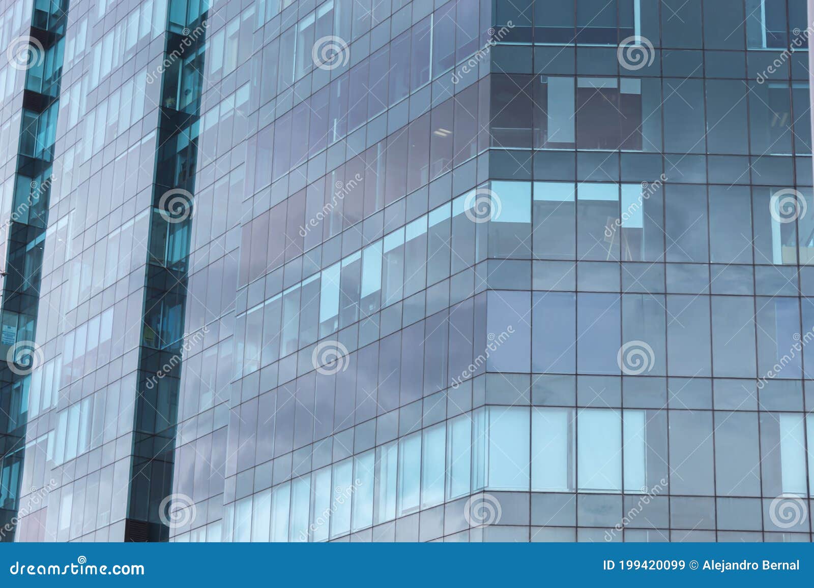 Closeup To a Modern Blue Skyscraper Windows Reflection White Clouds and ...