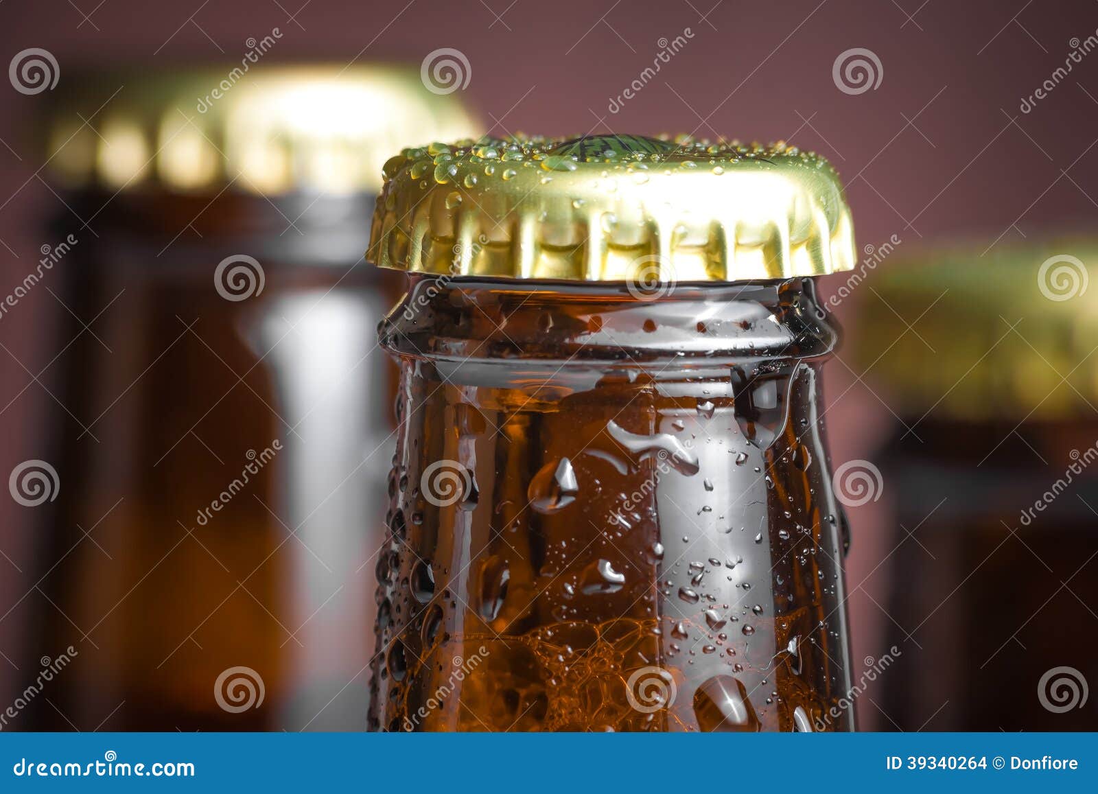 Closeup of Top of Bottle of Fresh Beer with Drops Stock Photo - Image ...