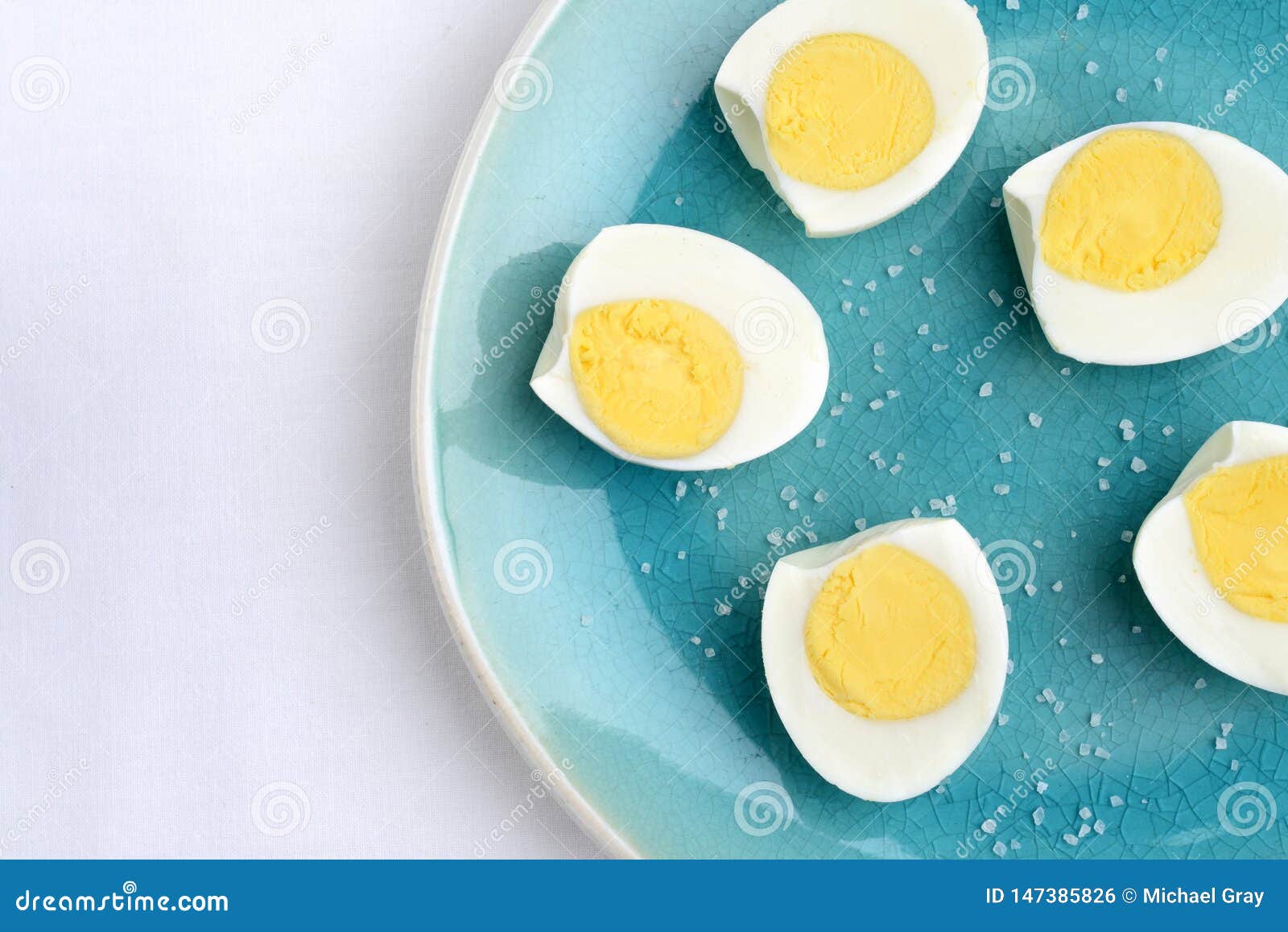 Closeup Top View Sliced Eggs with Salt Stock Photo - Image of eggs ...