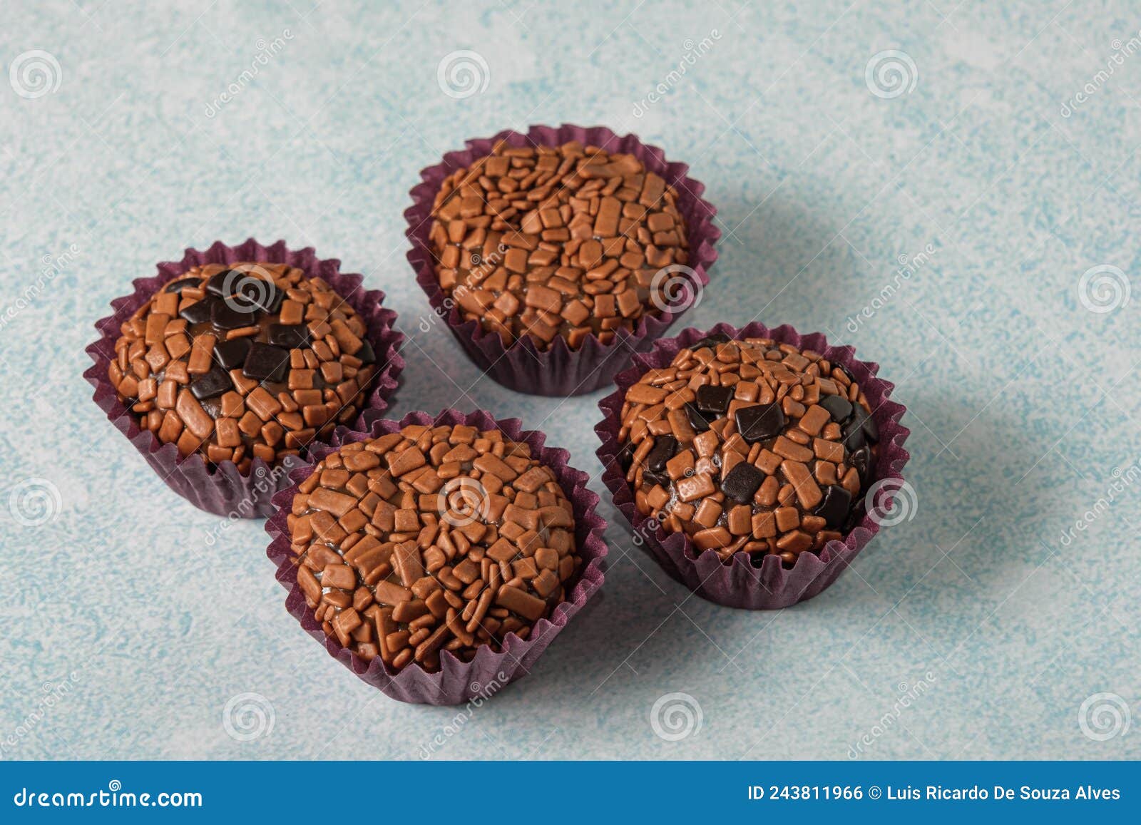 Closeup of Traditional and Bitter Brigadeiros on a Light Blue ...