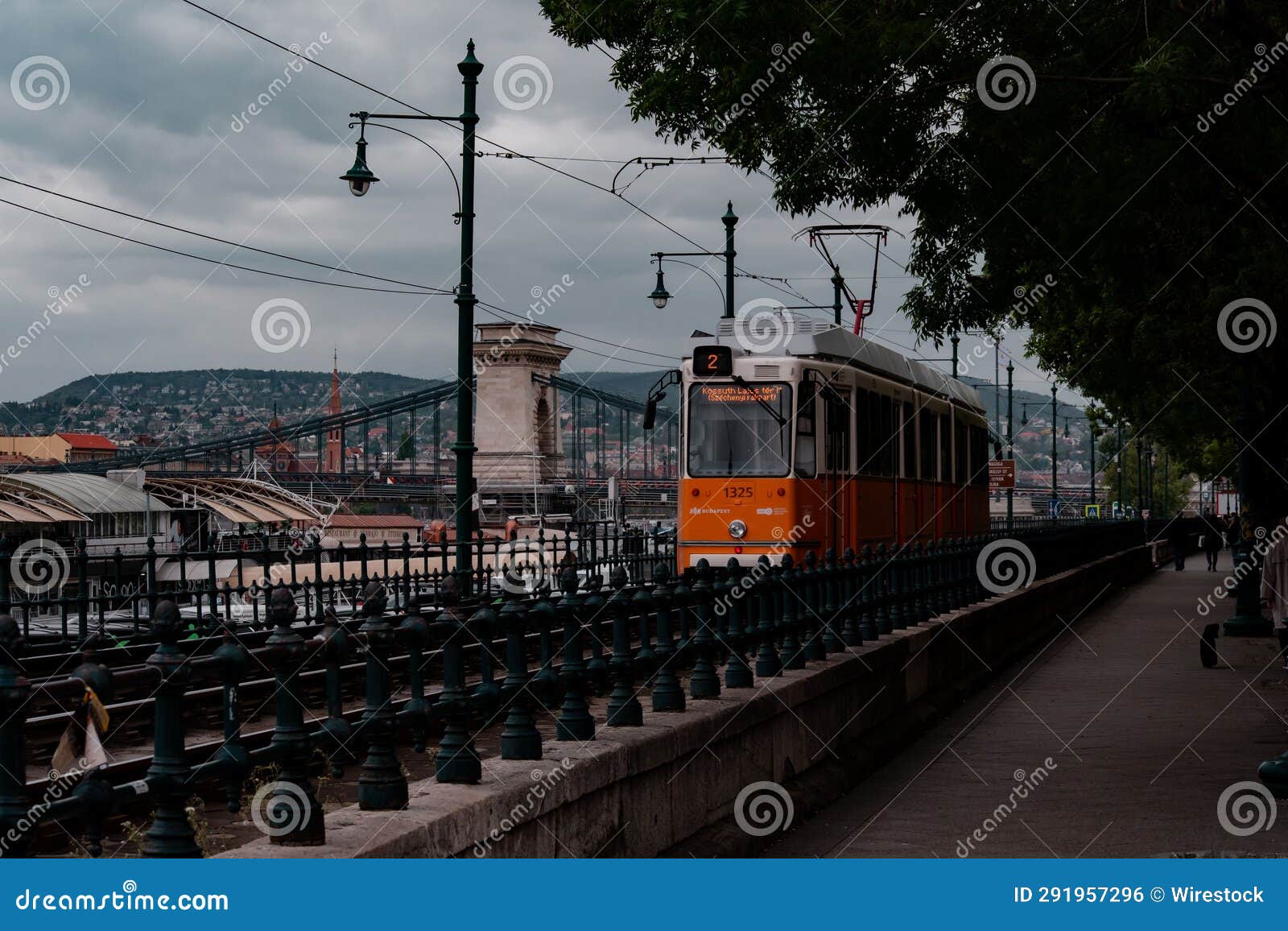 Closeup of a Train Traveling Underneath an Elevated Railway Line in ...