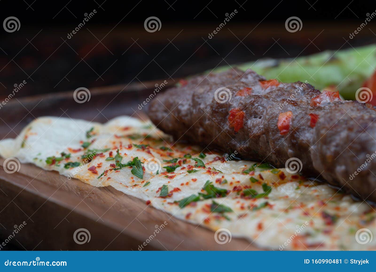 Turkish Lula Lamb Or Beef Kebab With Rice And Vegetables On Rustic ...