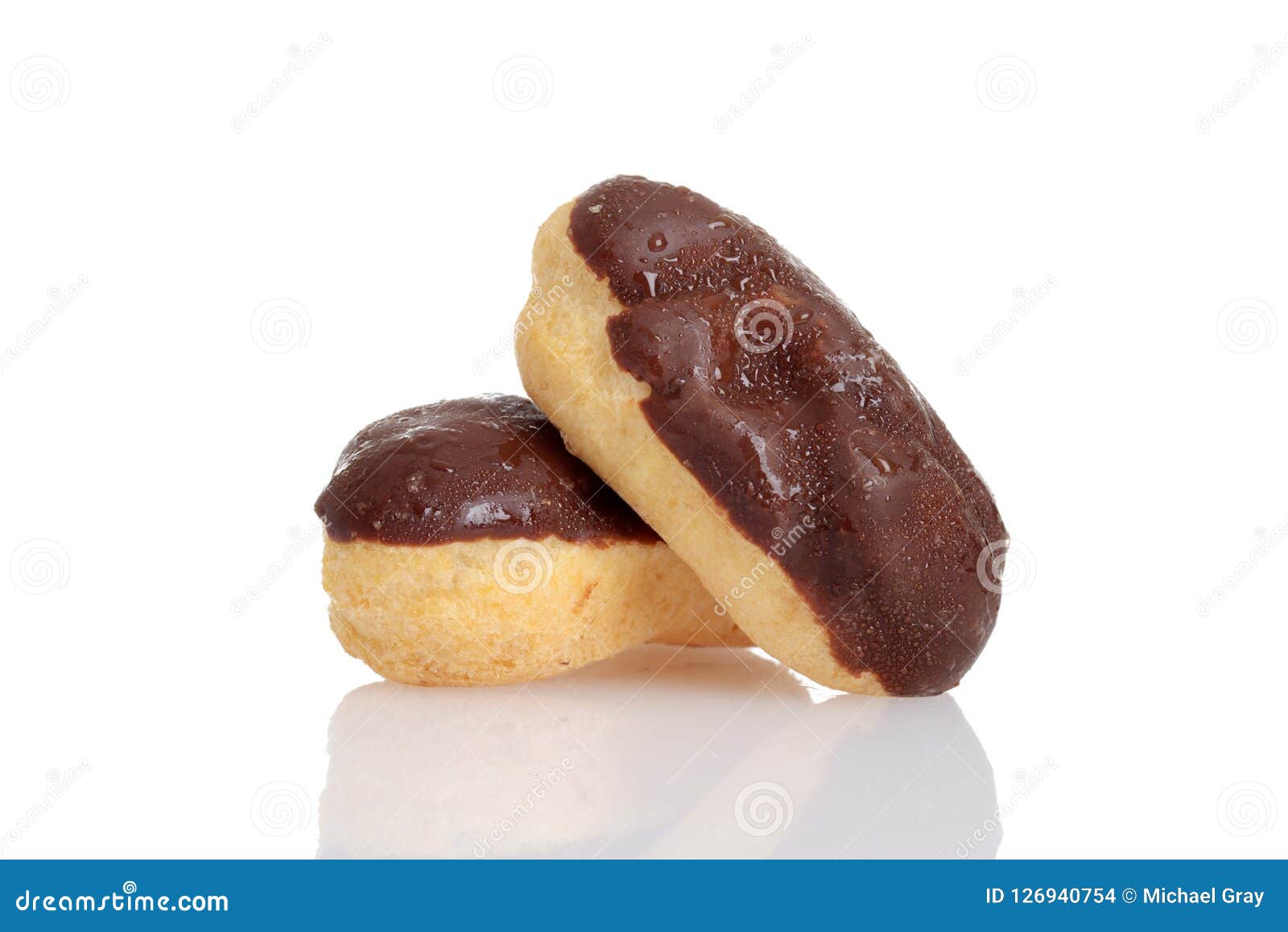 Two Chocolate Eclairs on White Stock Photo - Image of dessert, brown ...