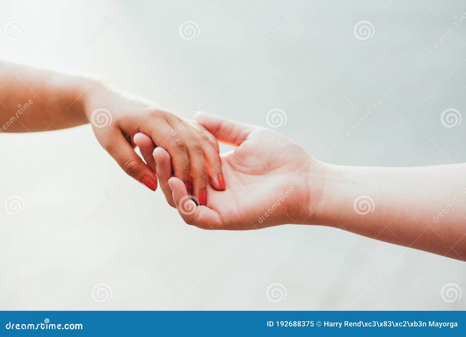 Closeup of two hands held stock image. Image of caring - 192688375
