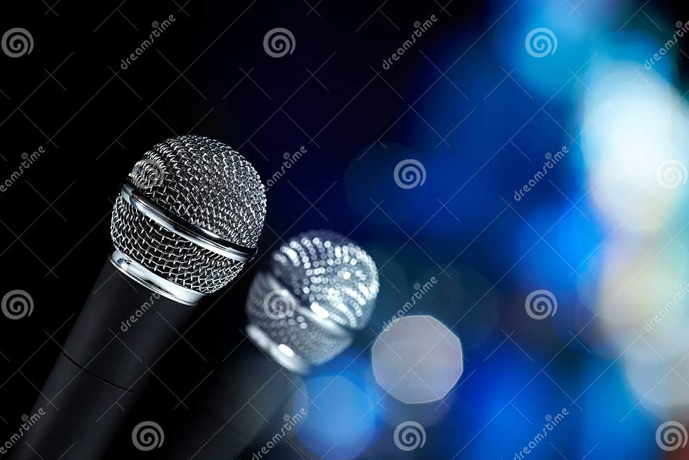 Closeup of Two Modern Microphones Stock Image - Image of modern, grid ...