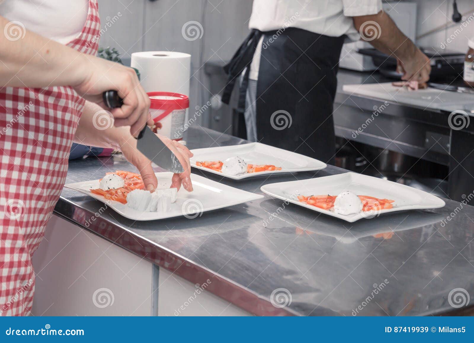 Closeup Two People Cooking, Coomercial Kitchen Stock Image - Image of ...